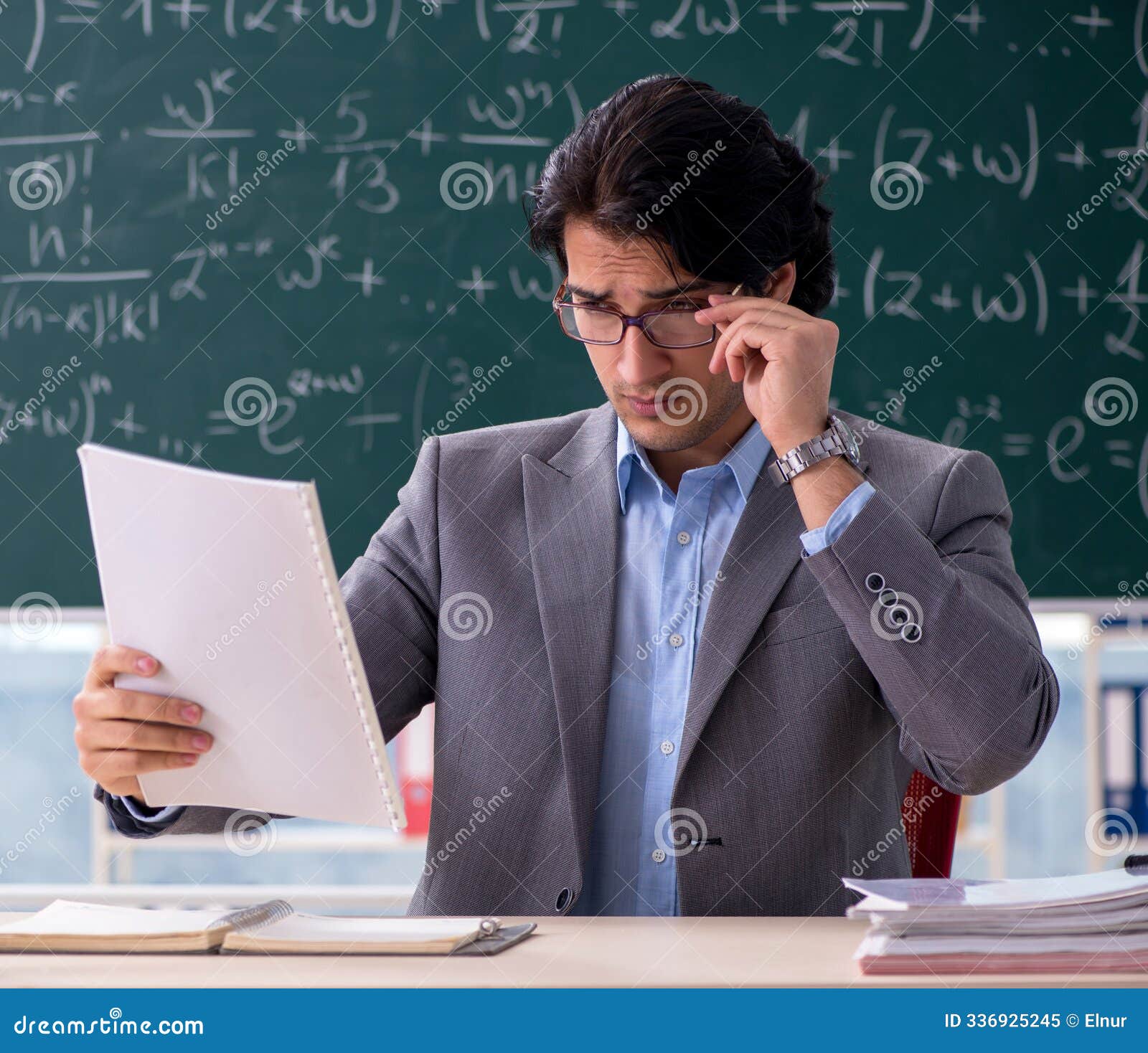 Young Handsome Math Teacher in Classroom Stock Image - Image of ...