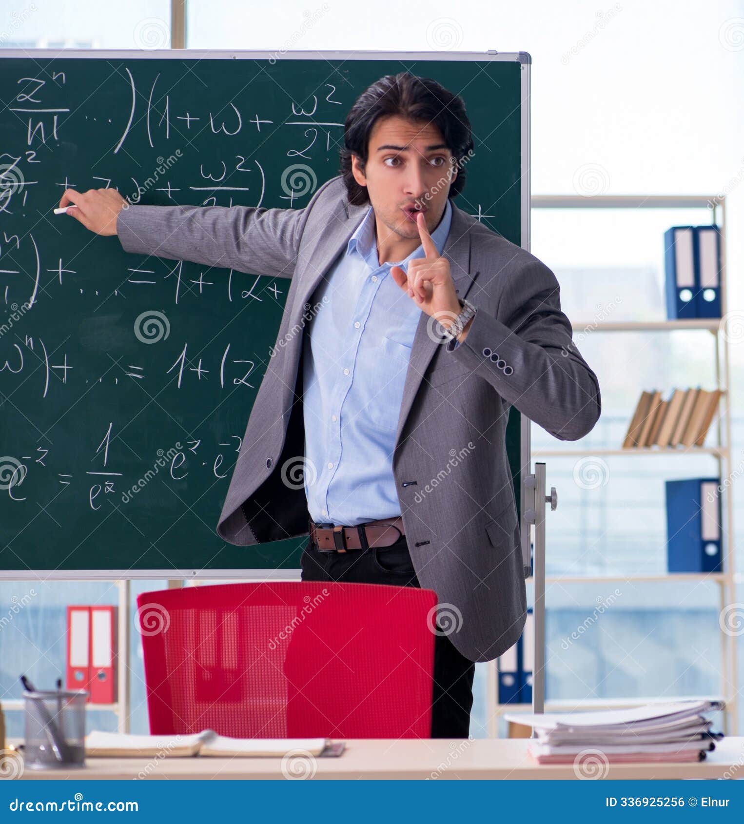 Young Handsome Math Teacher in Classroom Stock Photo - Image of class ...
