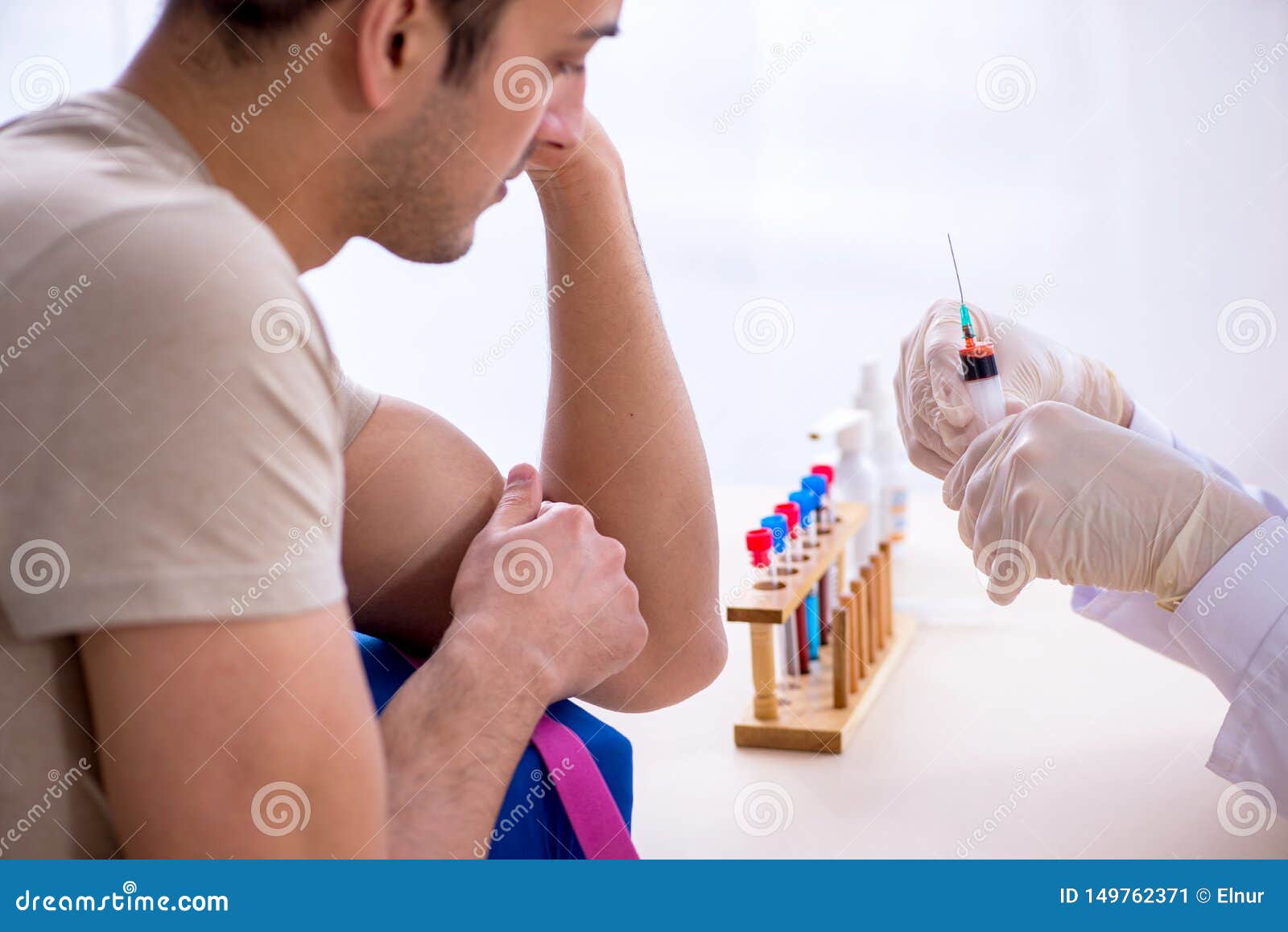Young Handsome Man during Blood Test Sampling Procedure Stock Image ...