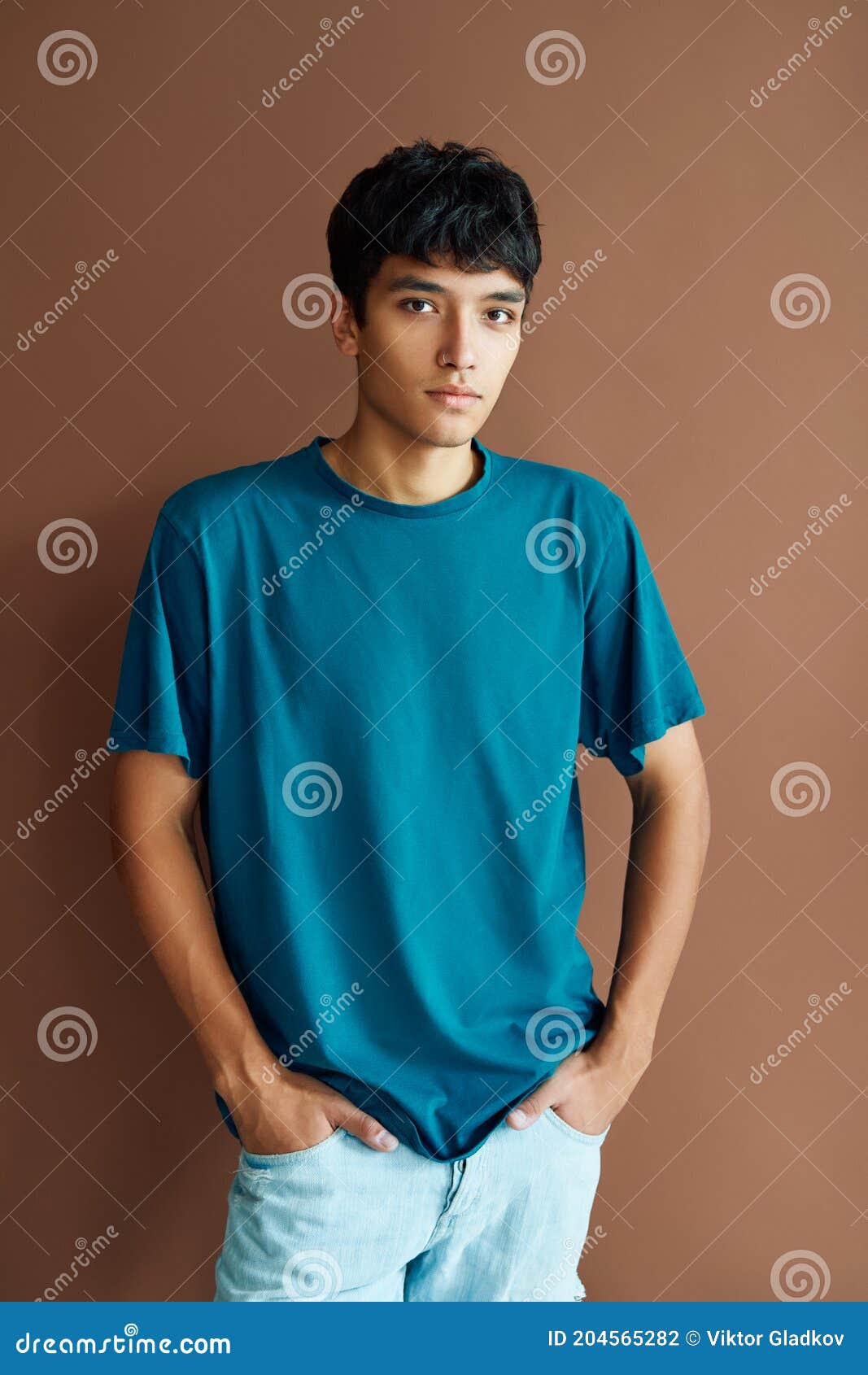 Young Handsome Mixed Race Man Posing on Studio Background Looking To ...