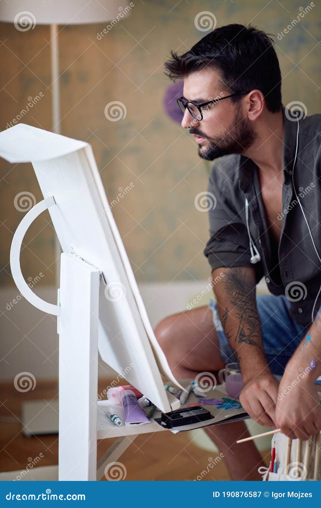 Young Handsome Painter Thinking about the Painting Stock Image - Image ...