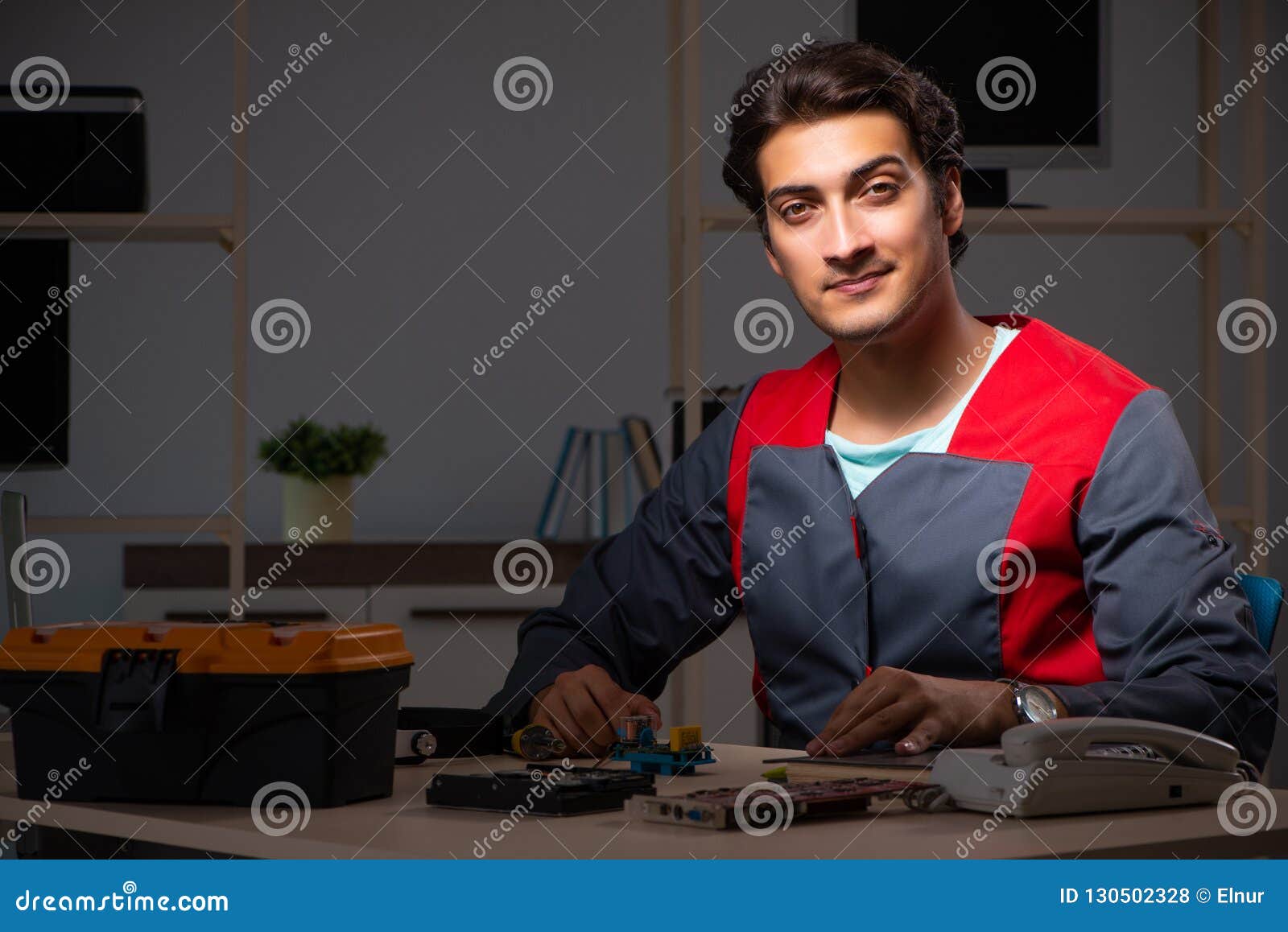 The Young Handsome Repairman Repairing Computer Stock Photo - Image of ...