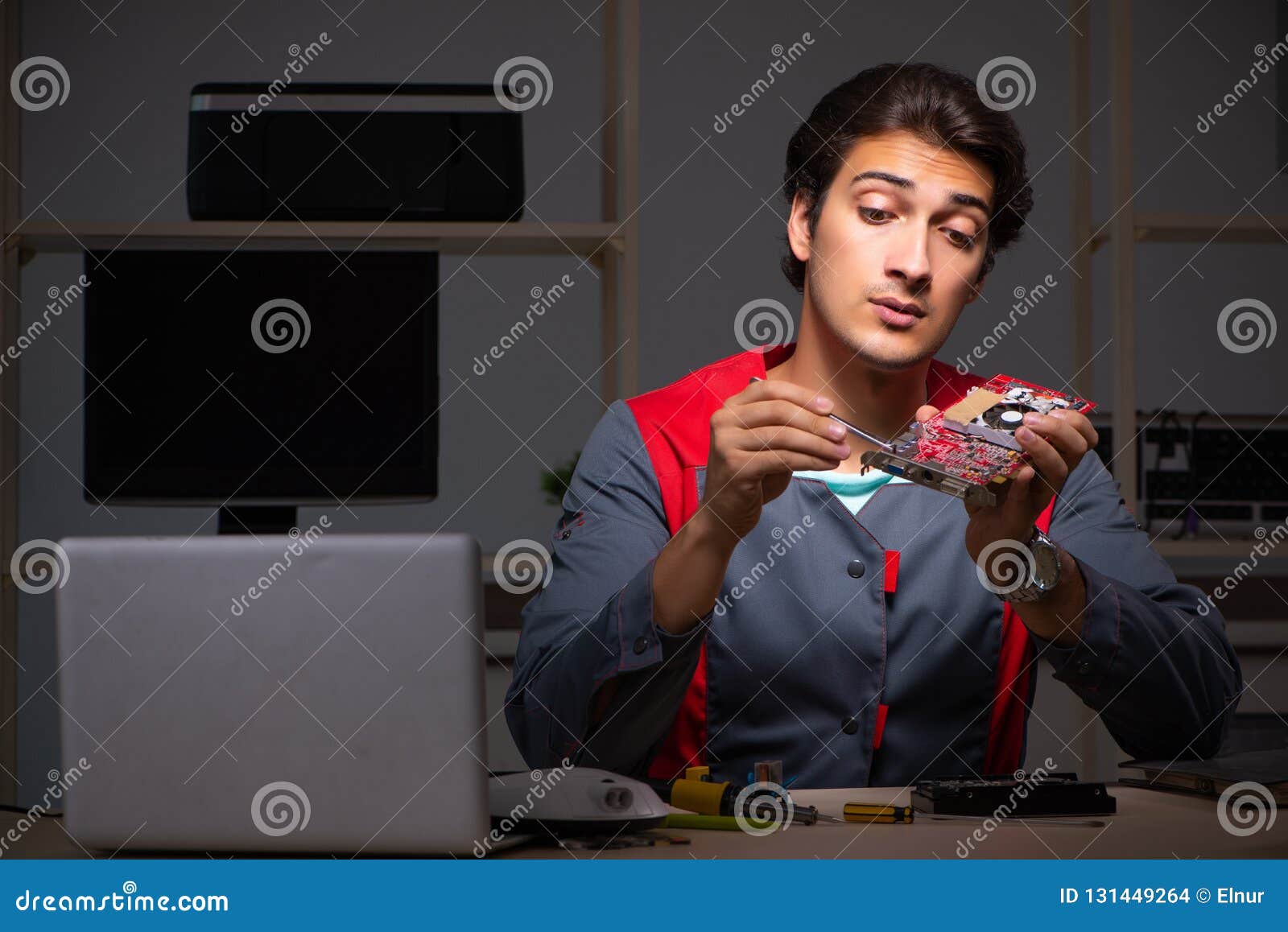 The Young Handsome Repairman Repairing Computer Stock Photo - Image of ...