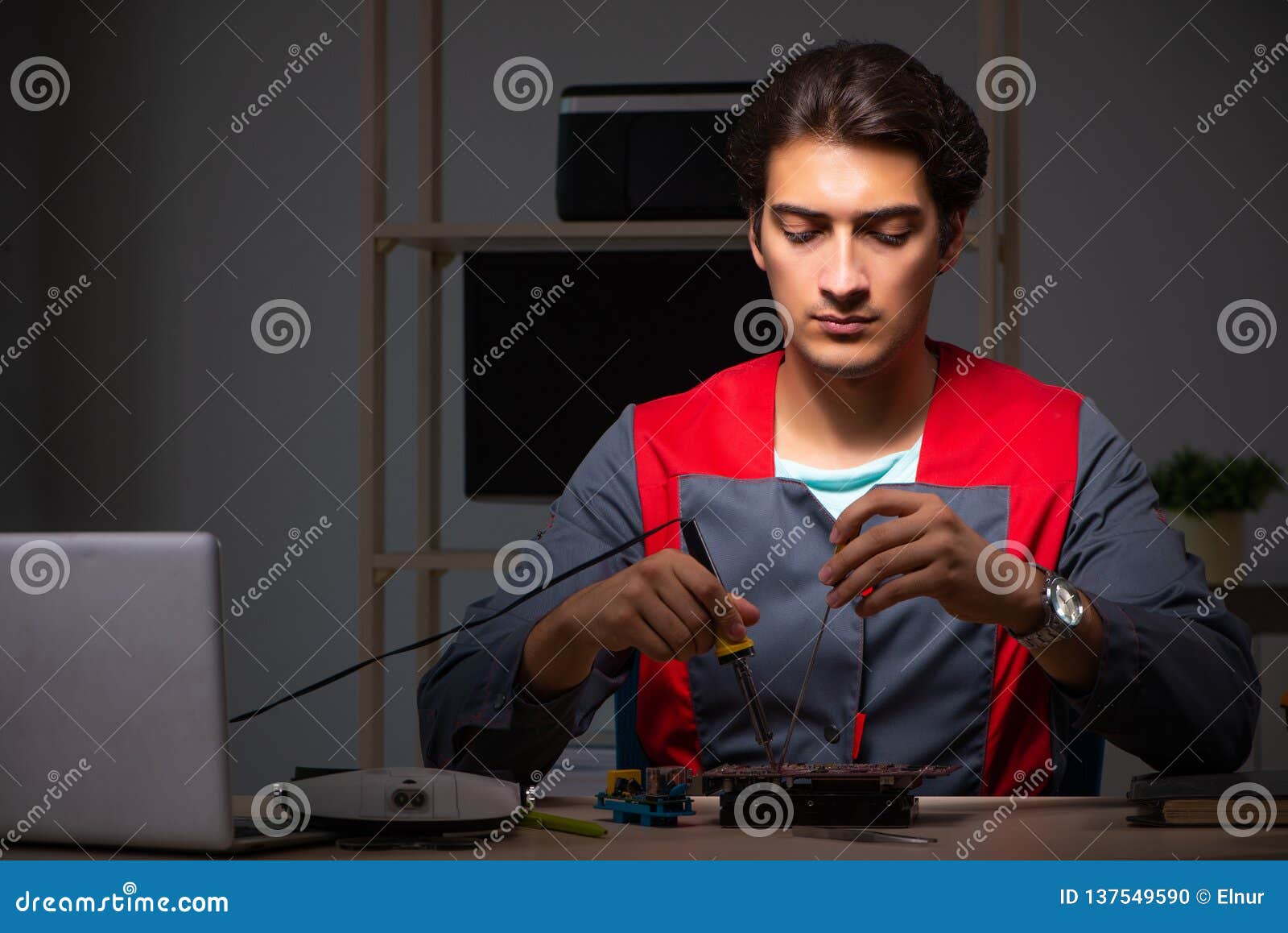 The Young Handsome Repairman Repairing Computer Stock Photo - Image of ...