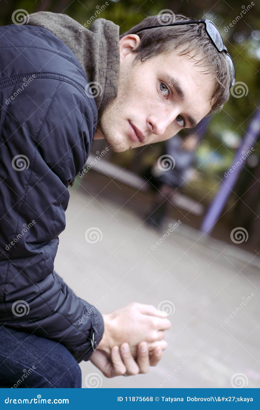 Young Handsome Sad Man Seating On Bench In Park Stock Photo ...