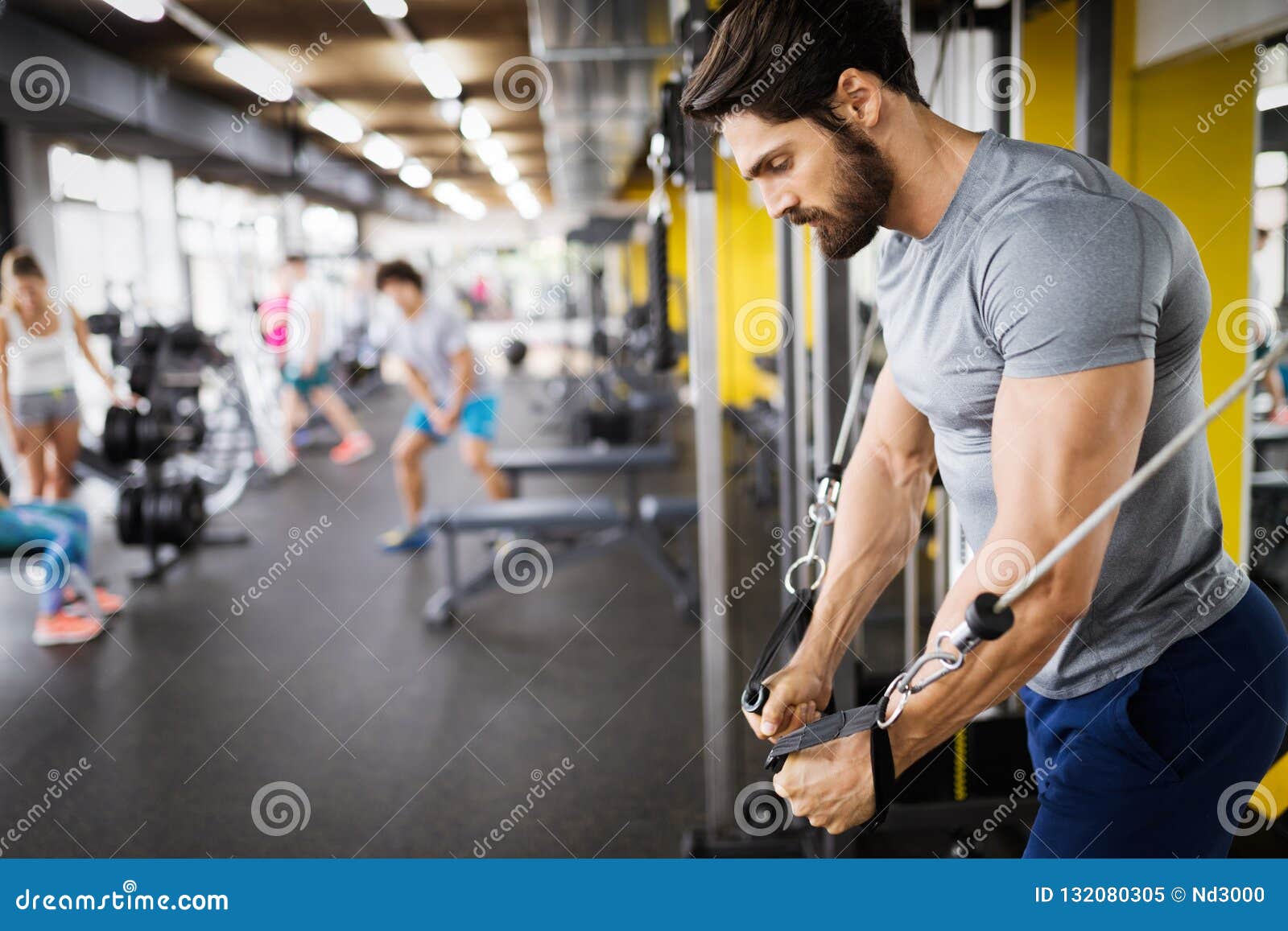 Young Handsome Man Doing Exercises in Gym Stock Image - Image of ...