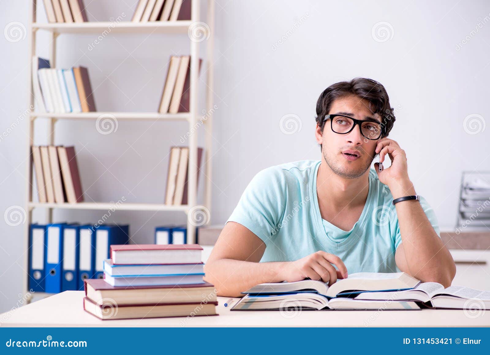 The Young Handsome Student Preparing for School Exams Stock Image ...