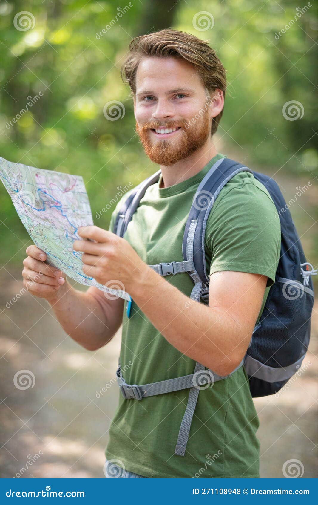 Young Handsome Tourist Smiling and Holding Map Stock Photo - Image of ...