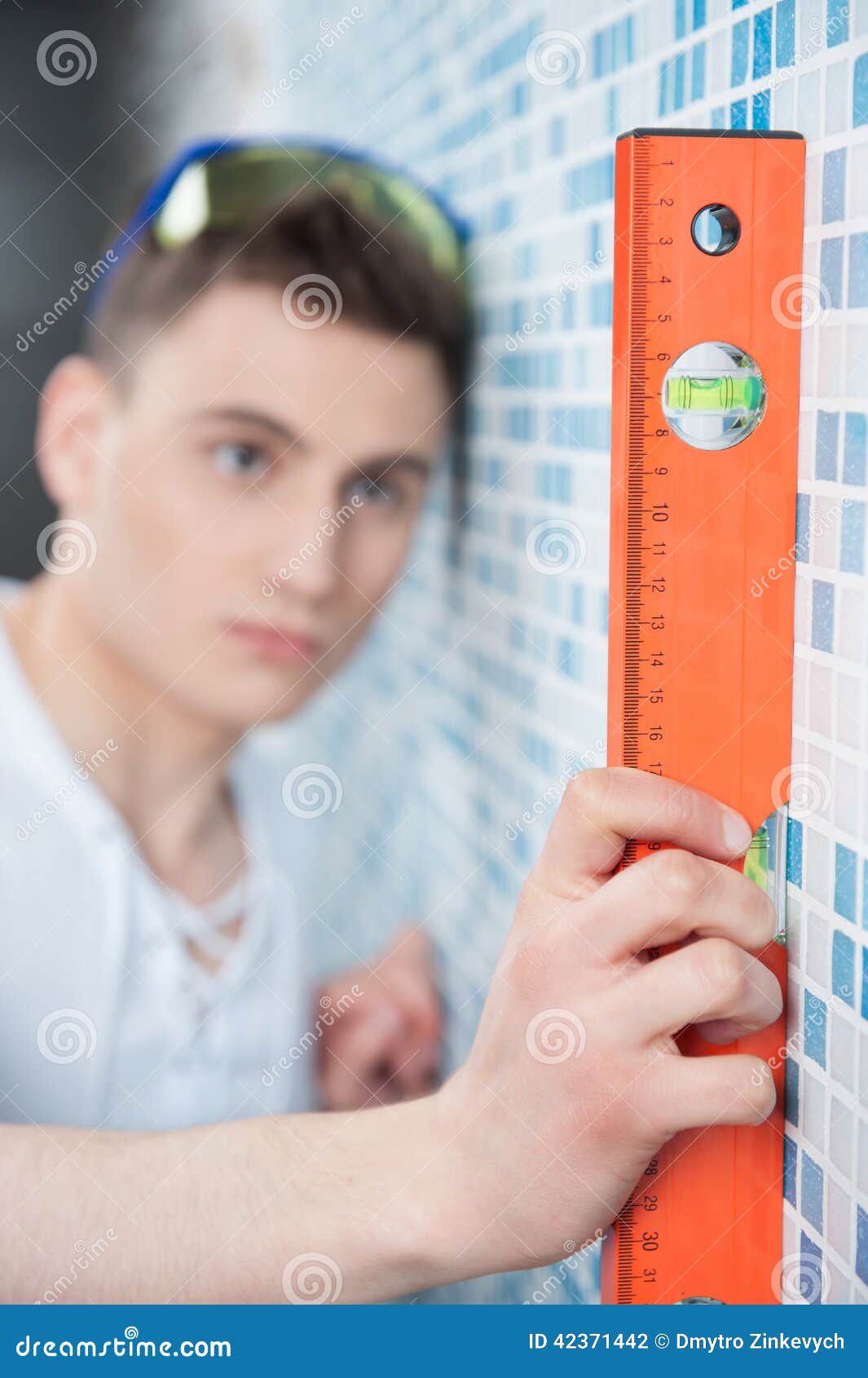 Young Handsome Worker with Spirit Level Stock Photo - Image of labor ...