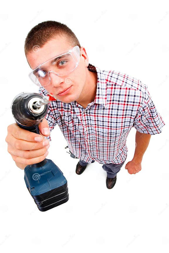 Young handyman drilling stock photo. Image of repairman - 17311074