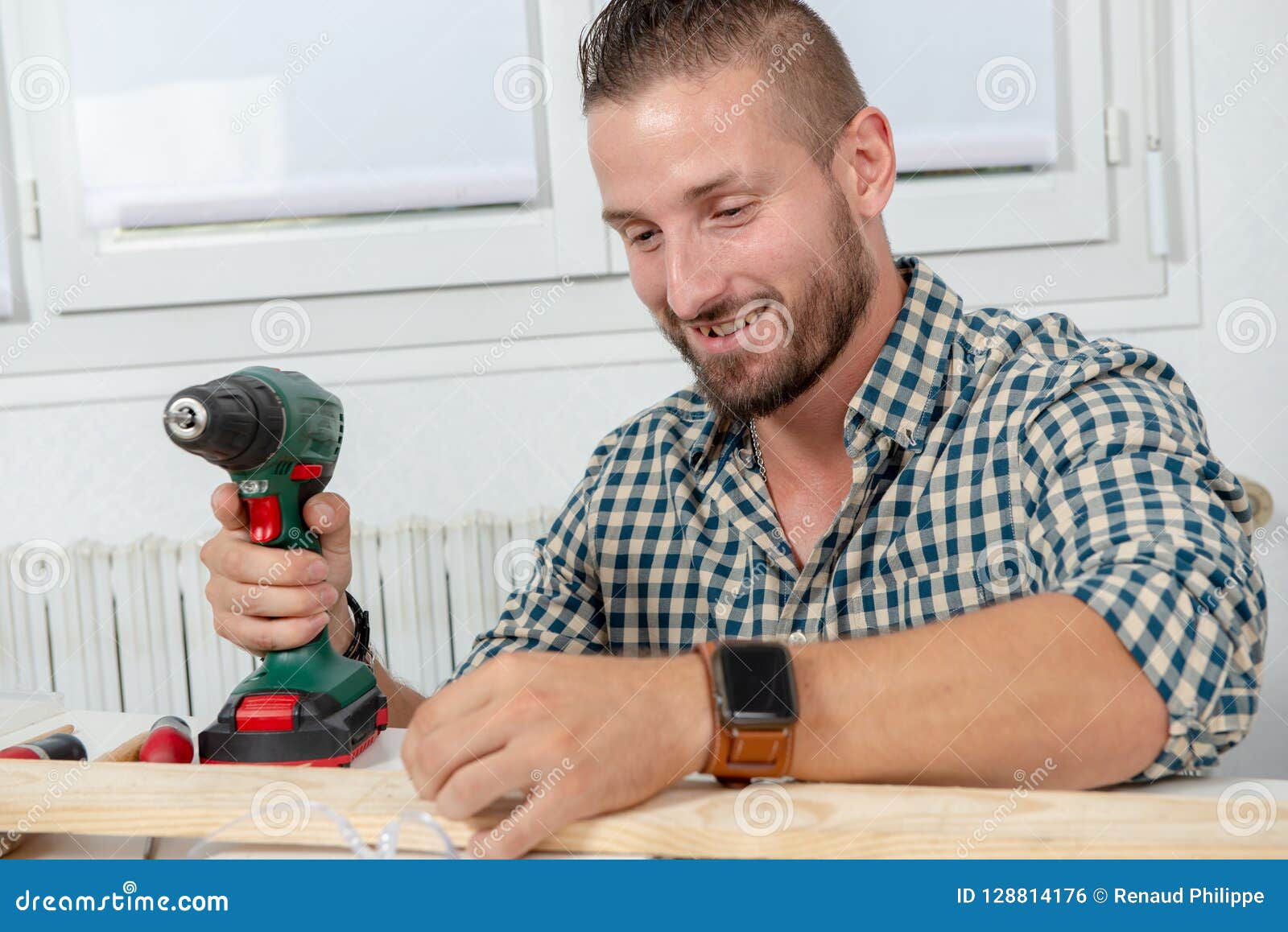 Young Handyman Using Electric Drill, DIY at Home Stock Photo - Image of ...