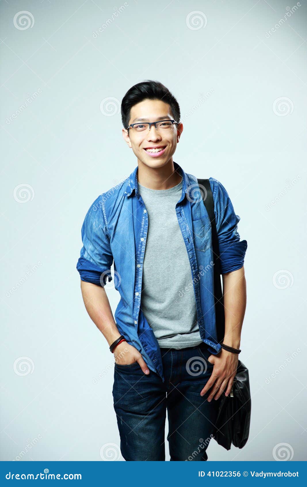 Young Happy Asian Man Standing Stock Photo - Image of glasses, human ...