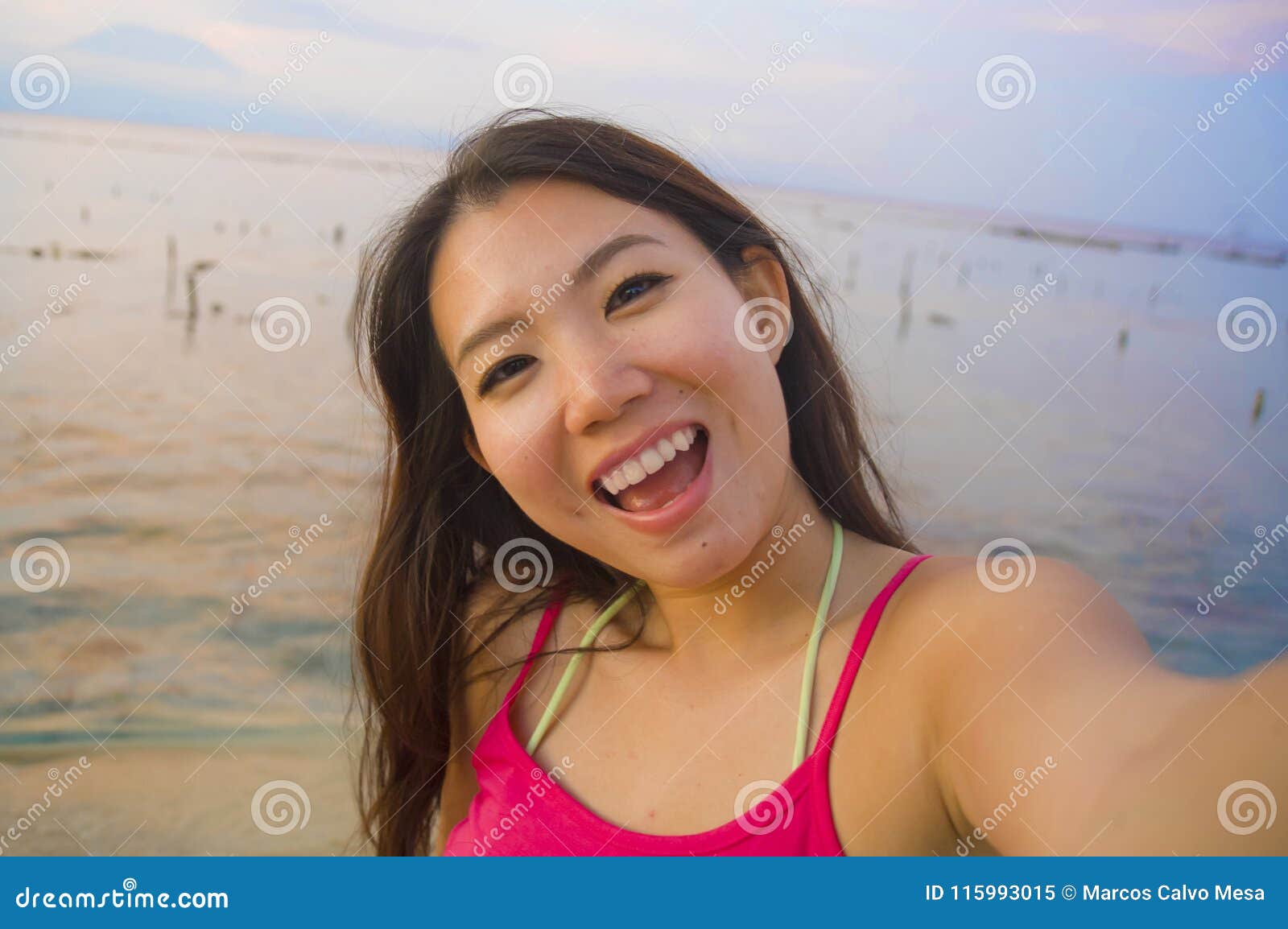 Young Happy And Beautiful Asian Korean Tourist Woman Taking Self