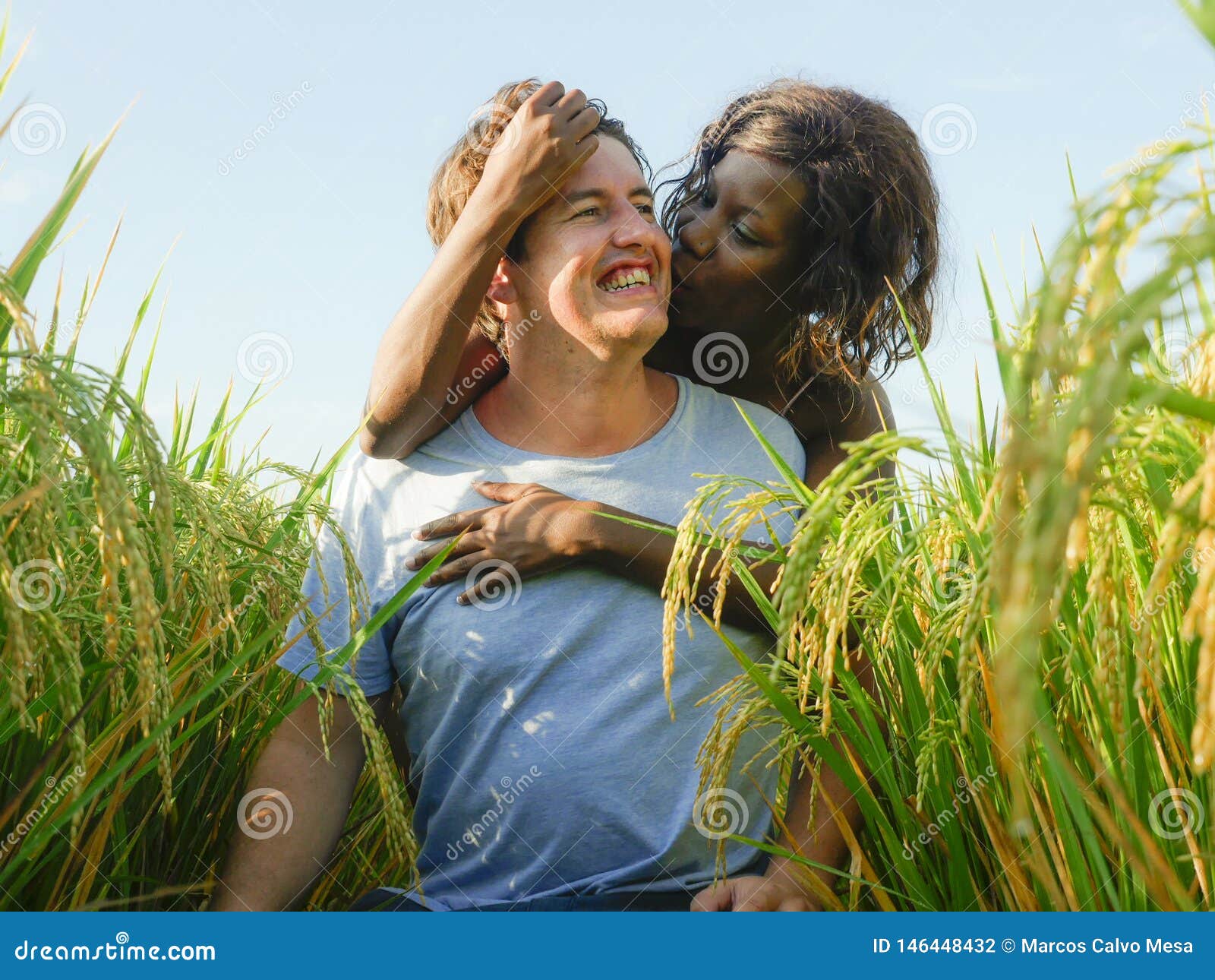 Young Happy And Beautiful Mixed Ethnicity Couple With Black Afro
