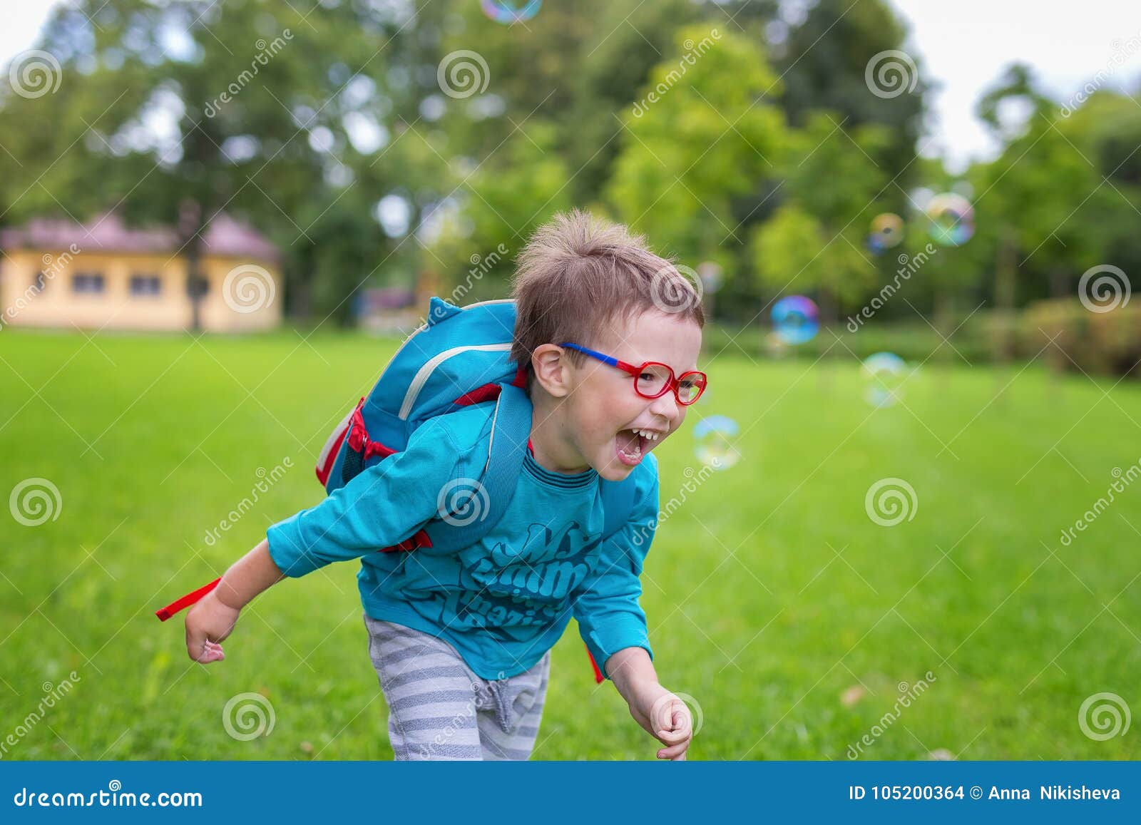 Young Happy Boy Running in the Grass at the Park on a Summer Day Stock ...
