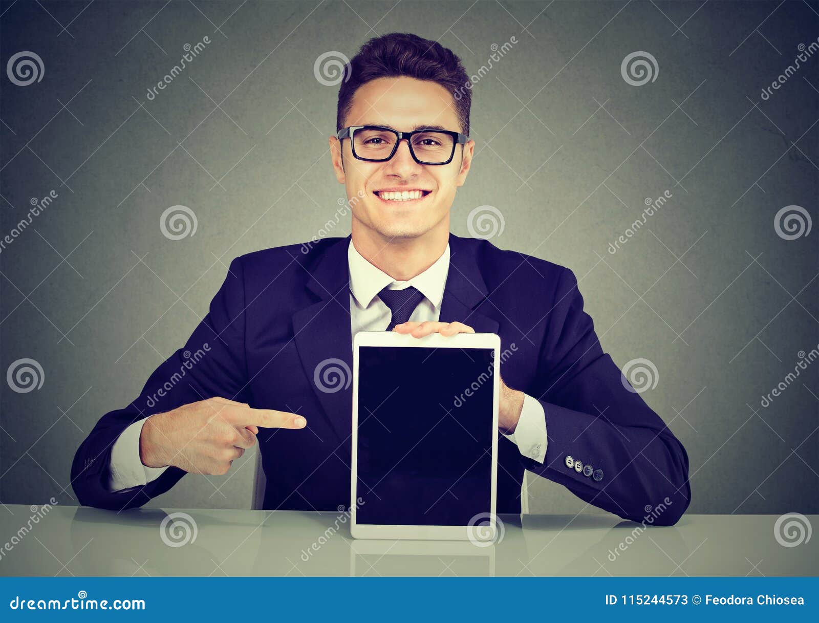 Young Happy Business Man Showing a Tablet Stock Image - Image of online ...