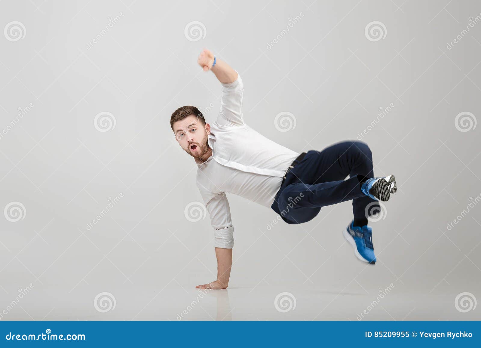 Young Happy Businessman with Beard in Shirt Break Dancing on Gre Stock ...