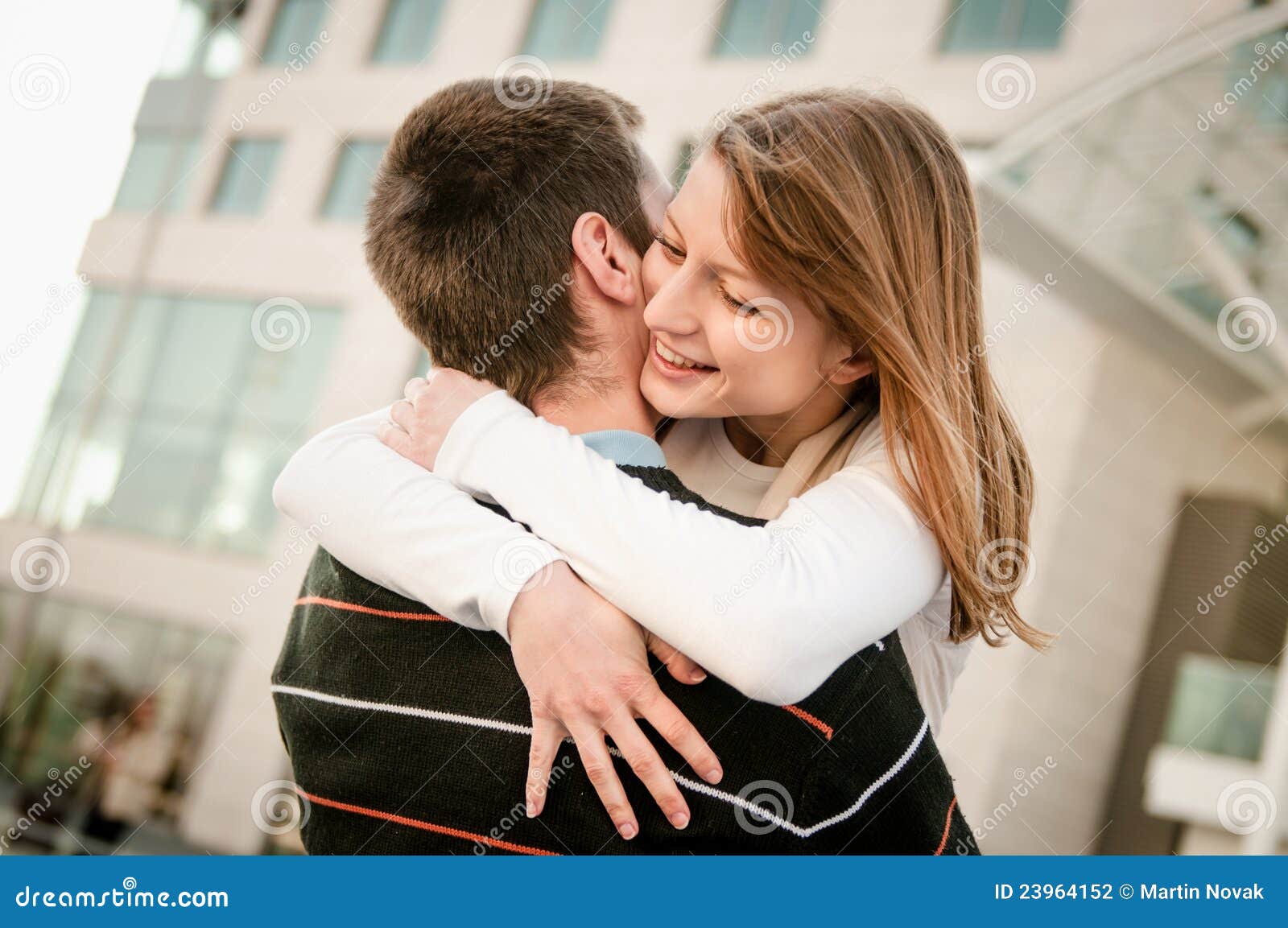 Young Happy Couple in Embracement Stock Photo - Image of cheerful ...