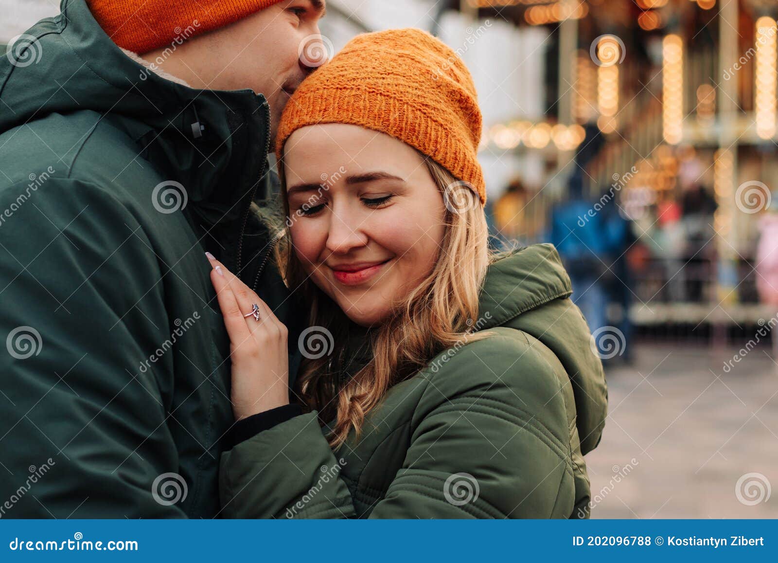 Young Happy Couple Having Fun Together At A Christmas Market