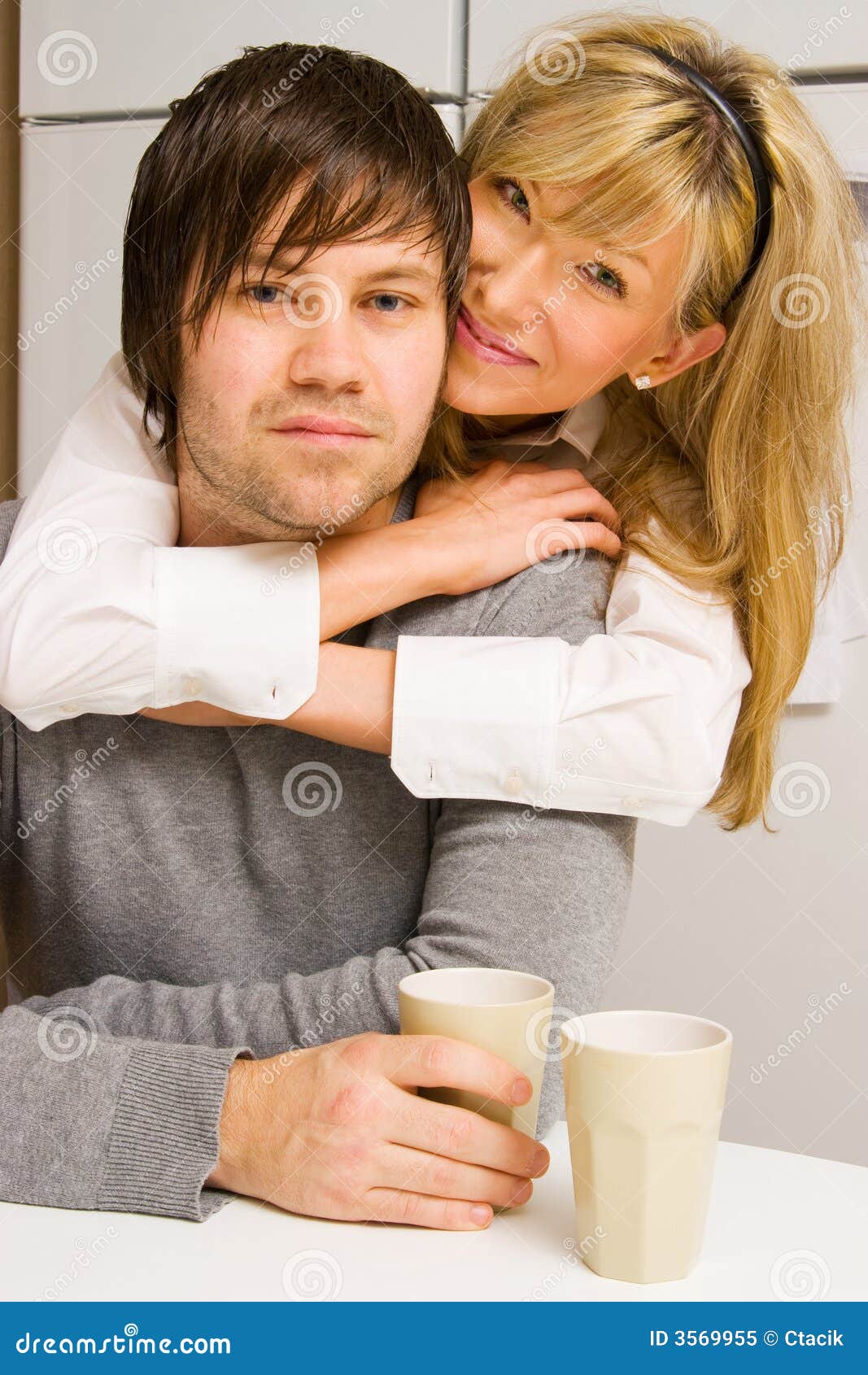 Young happy couple hugging stock image. Image of woman - 3569955