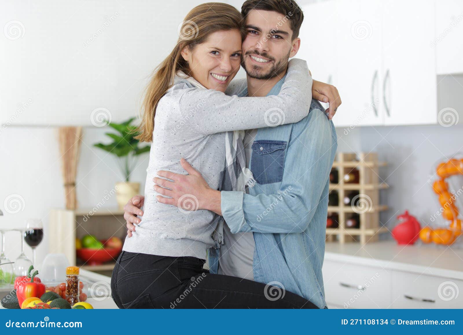 Young Happy Couple Hugging in Kitchen in Morning Stock Photo - Image of ...
