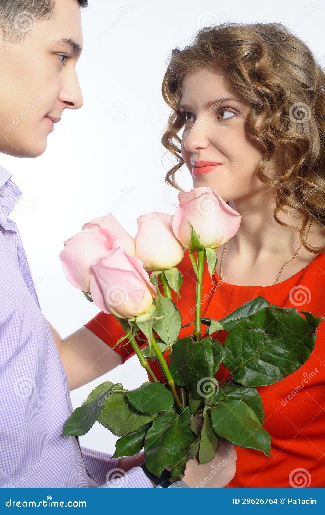 Young Happy Couple with Pink Roses Stock Photo - Image of feeling ...