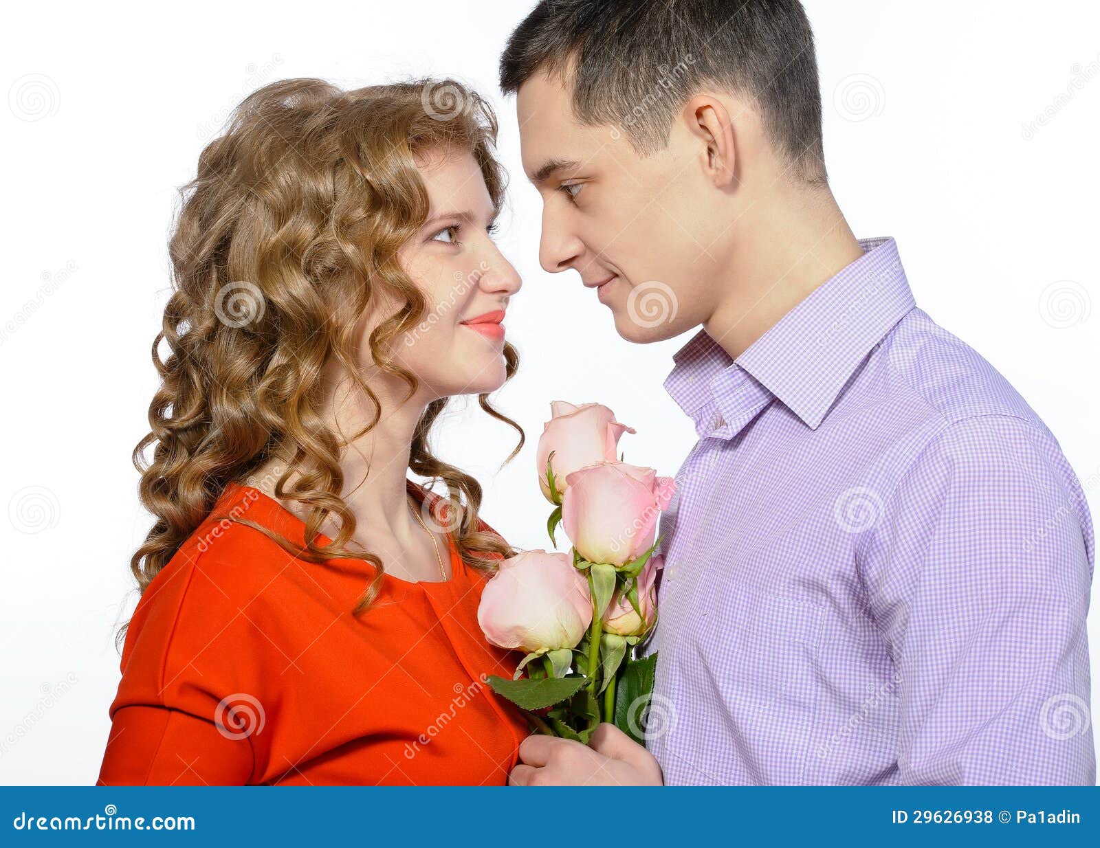 Young Happy Couple with Pink Roses Stock Photo - Image of beautiful ...