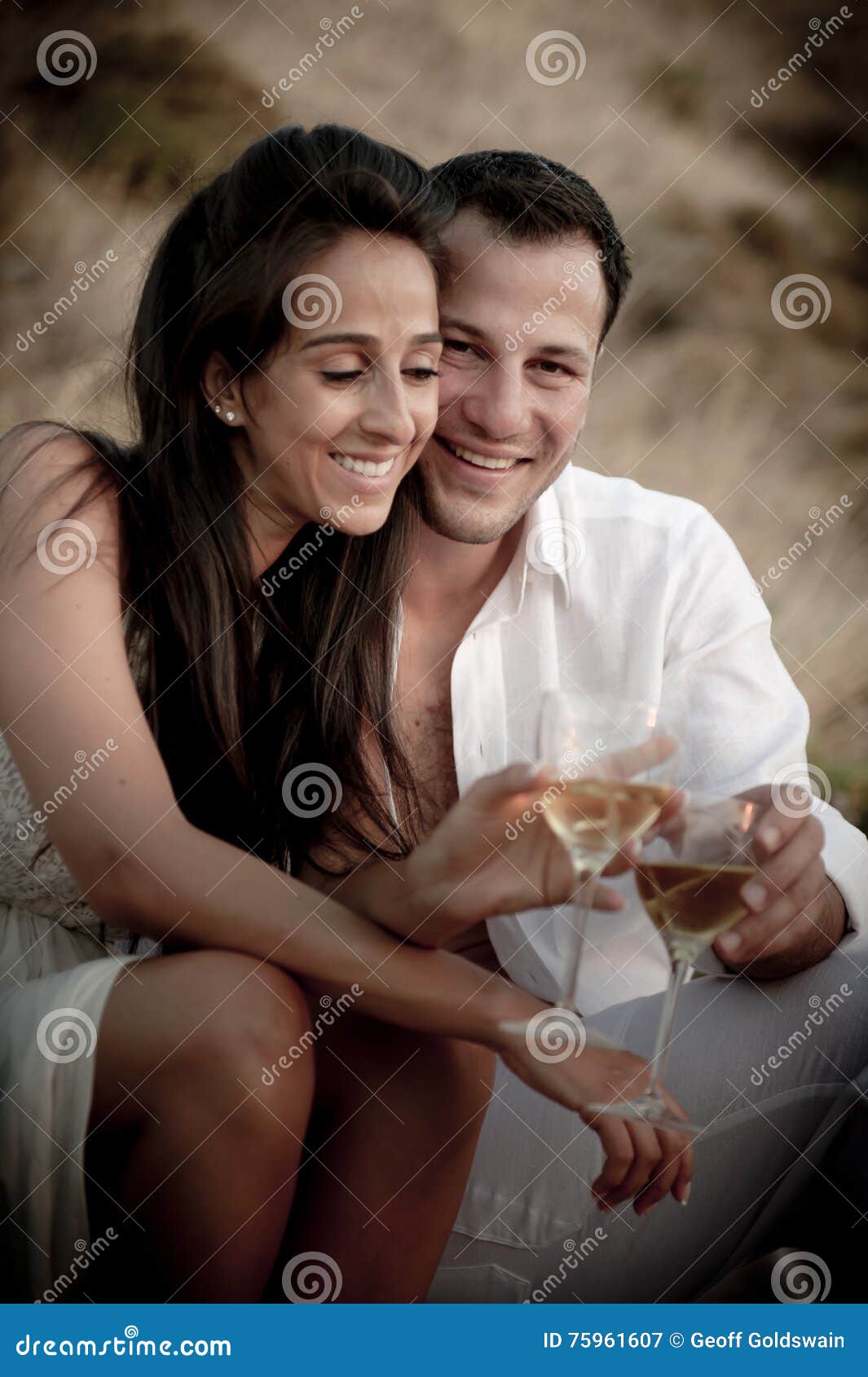 Young Happy Couple Sitting Together Having Fun Stock Image - Image of ...