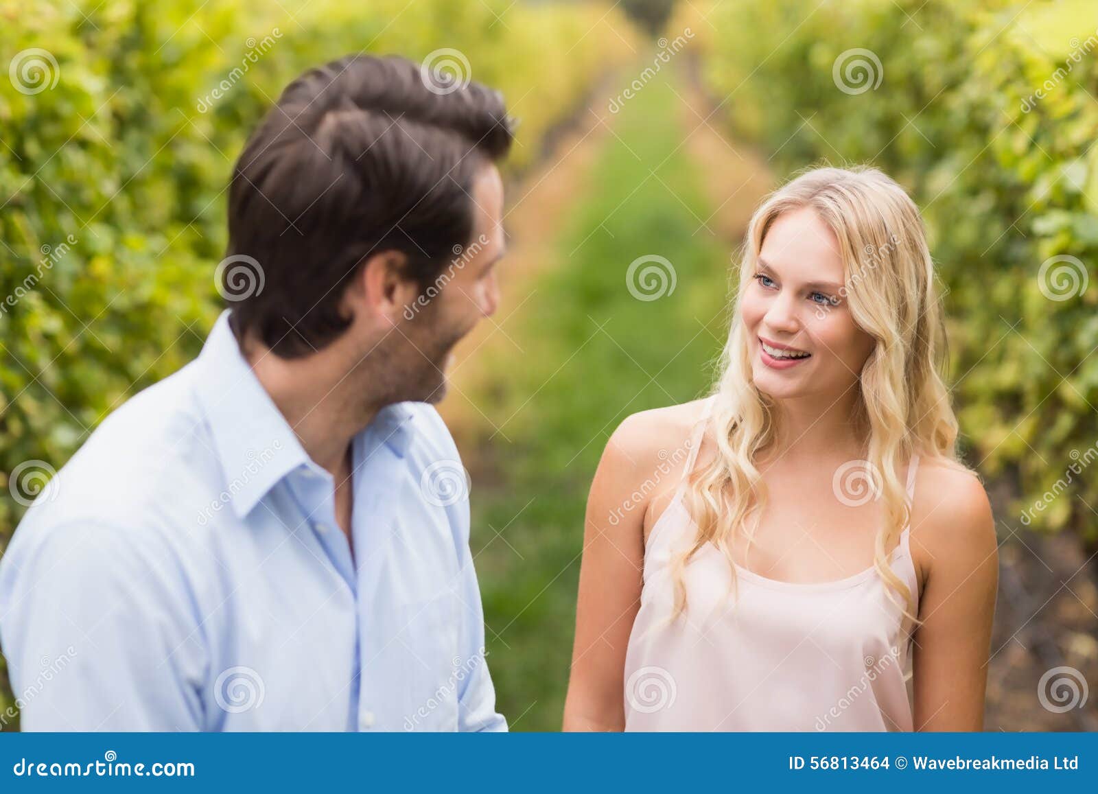 Young Happy Couple Smiling at Each Other Stock Photo - Image of people ...