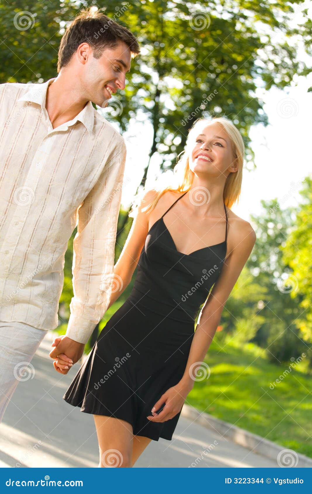 Young happy couple walking stock photo. Image of female - 3223344