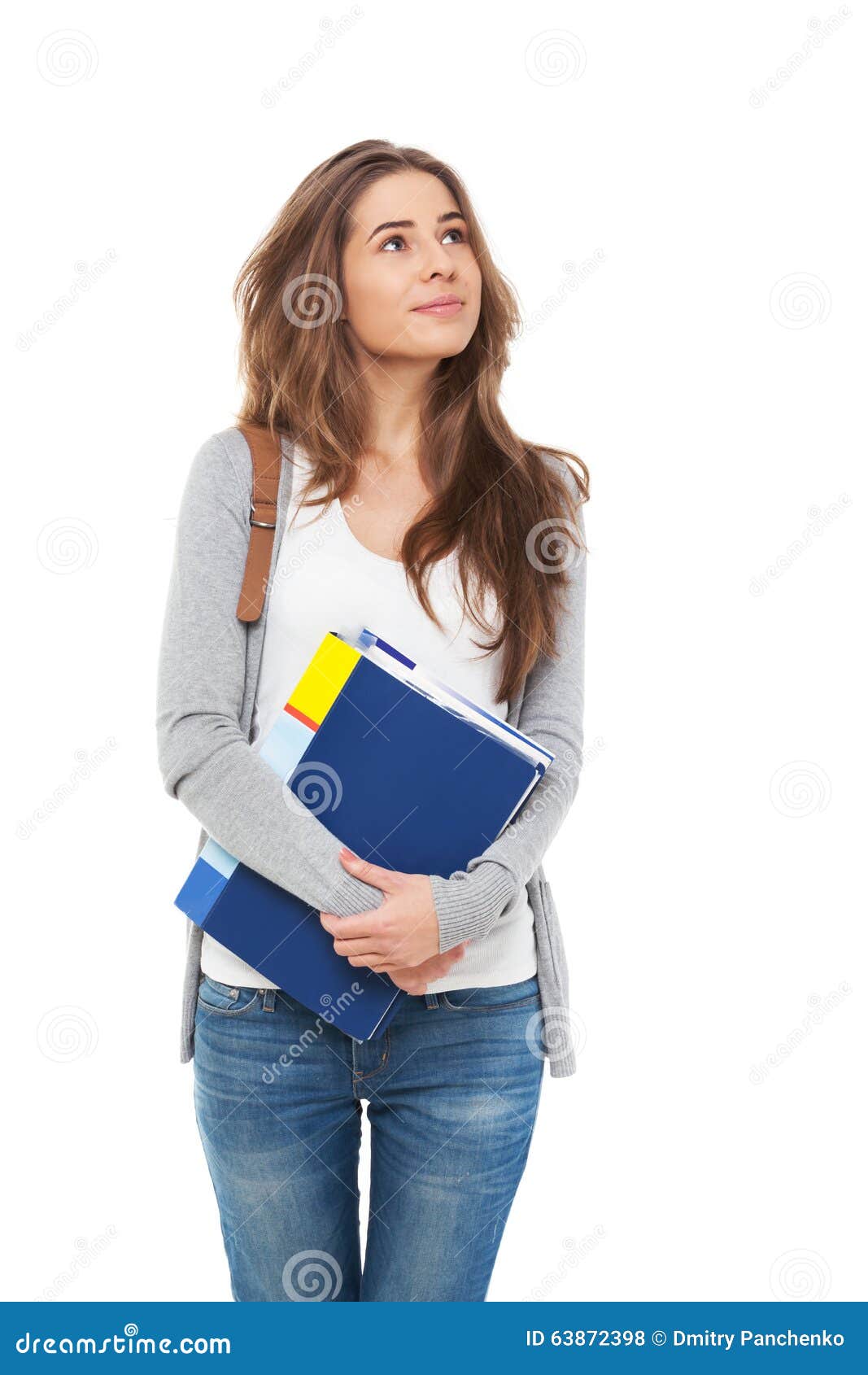 Young Happy Female Student Looking Looking Up Isolated. Stock Photo ...