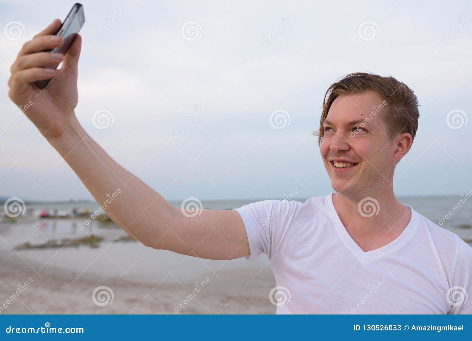 Young Happy Handsome Man Smiling while Taking Selfie Picture Wit Stock ... Young Happy Handsome Man Smiling while Taking Selfie Picture Wit Stock ...