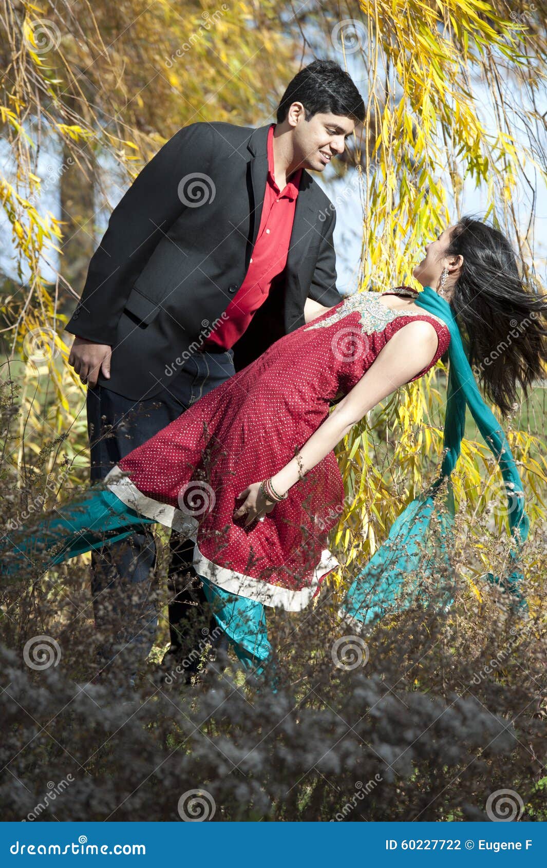 Young Happy Indian Couple stock photo. Image of grass - 60227722
