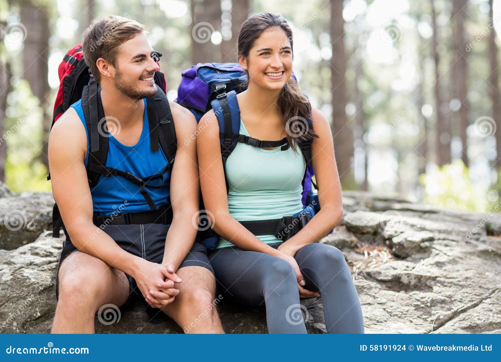 Young Happy Joggers Looking at Something in the Distance Stock Photo ...