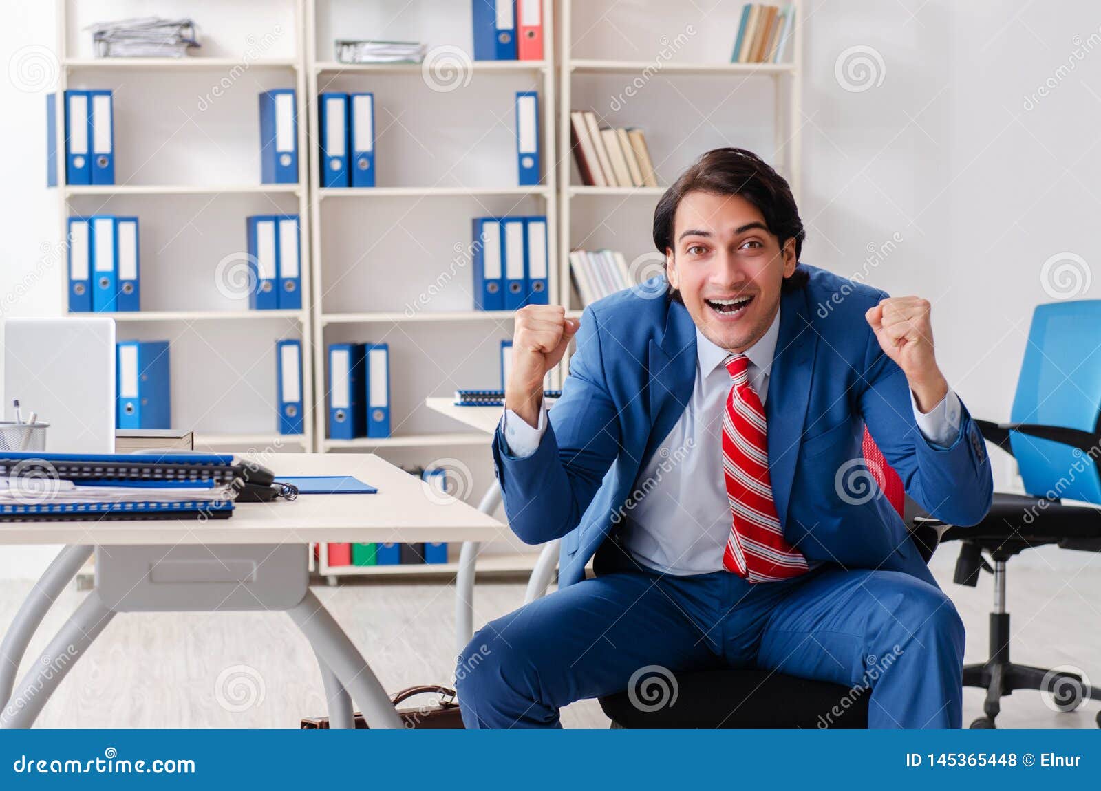 The Young Happy Male Employee in the Office Stock Photo - Image of ...