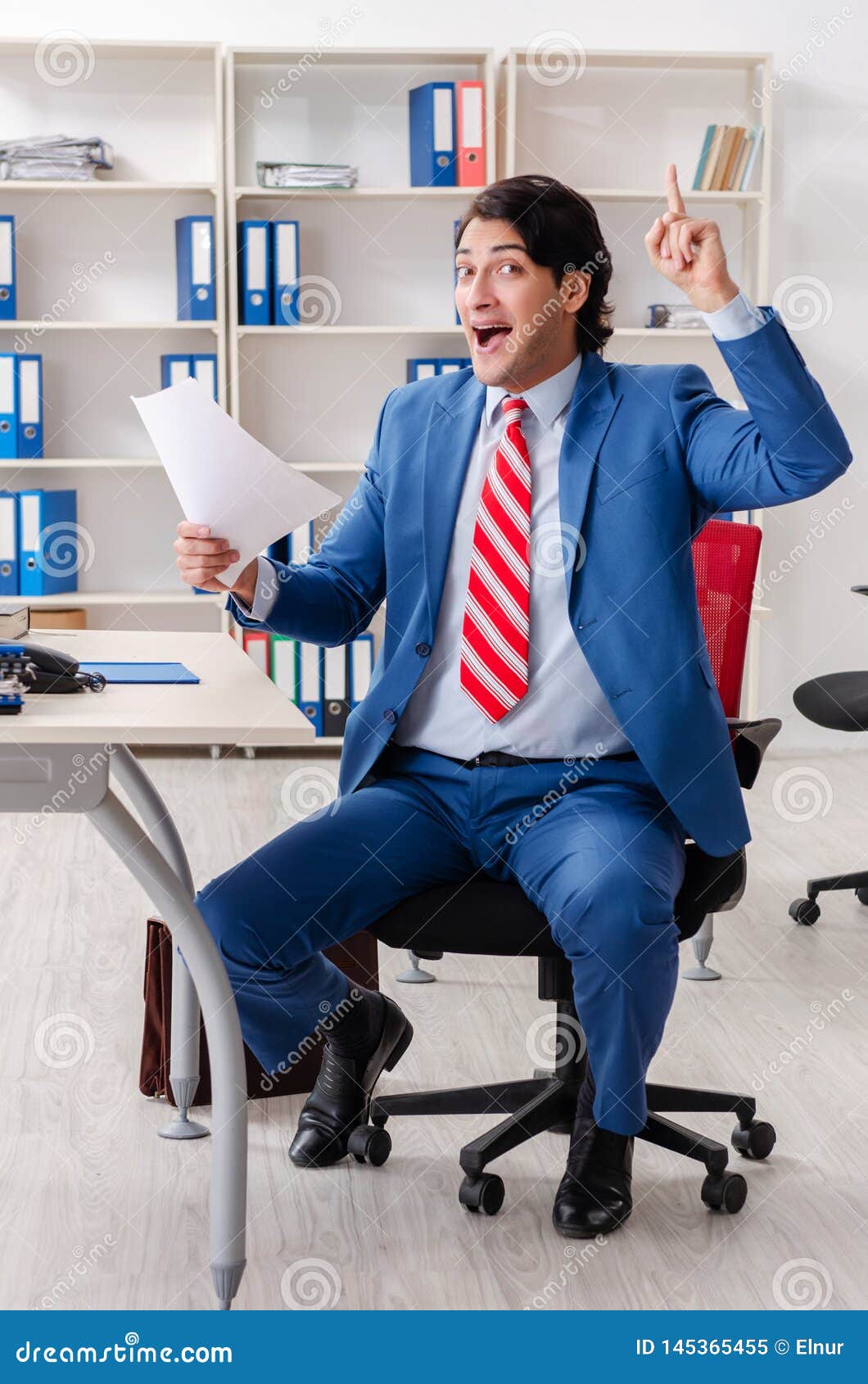 The Young Happy Male Employee in the Office Stock Image - Image of ...