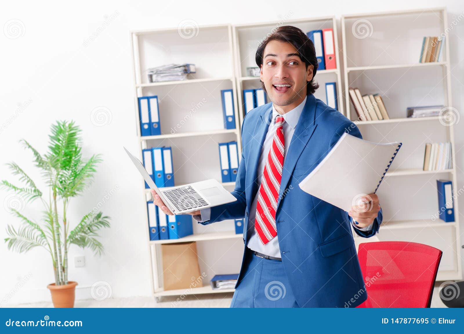 The Young Happy Male Employee in the Office Stock Image - Image of ...