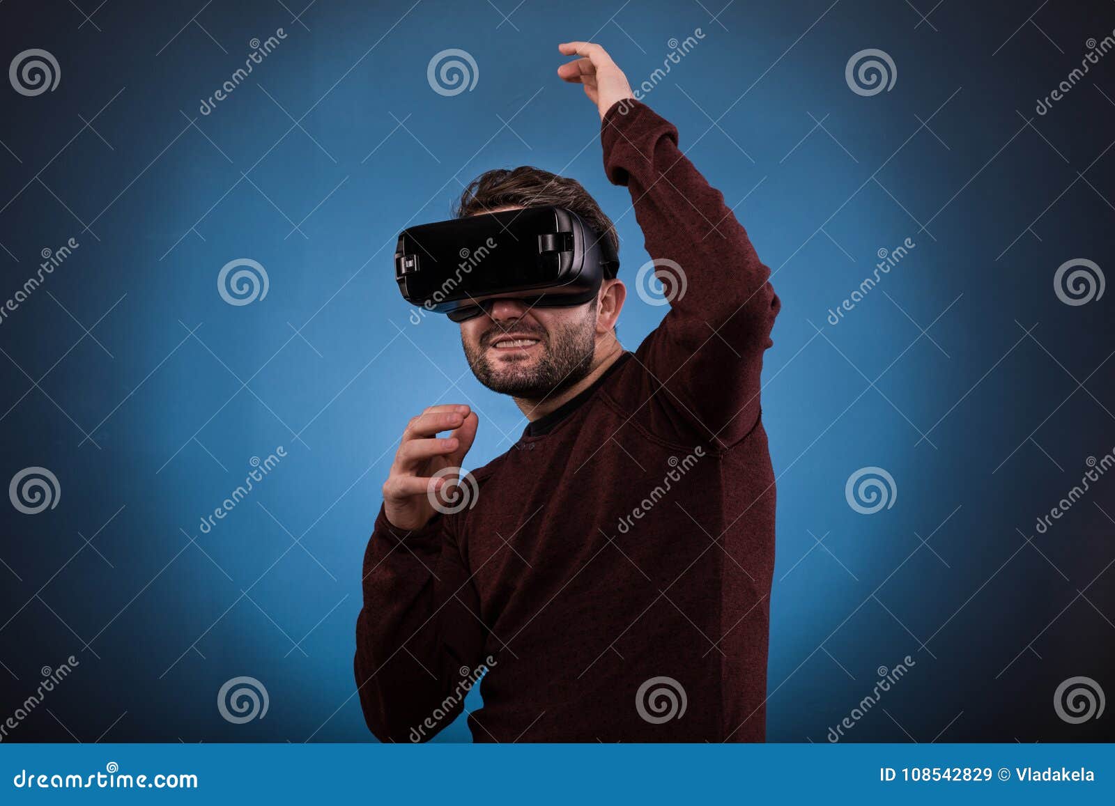 Young Happy Man Experiencing Virtual Reality through a VR Headset ...