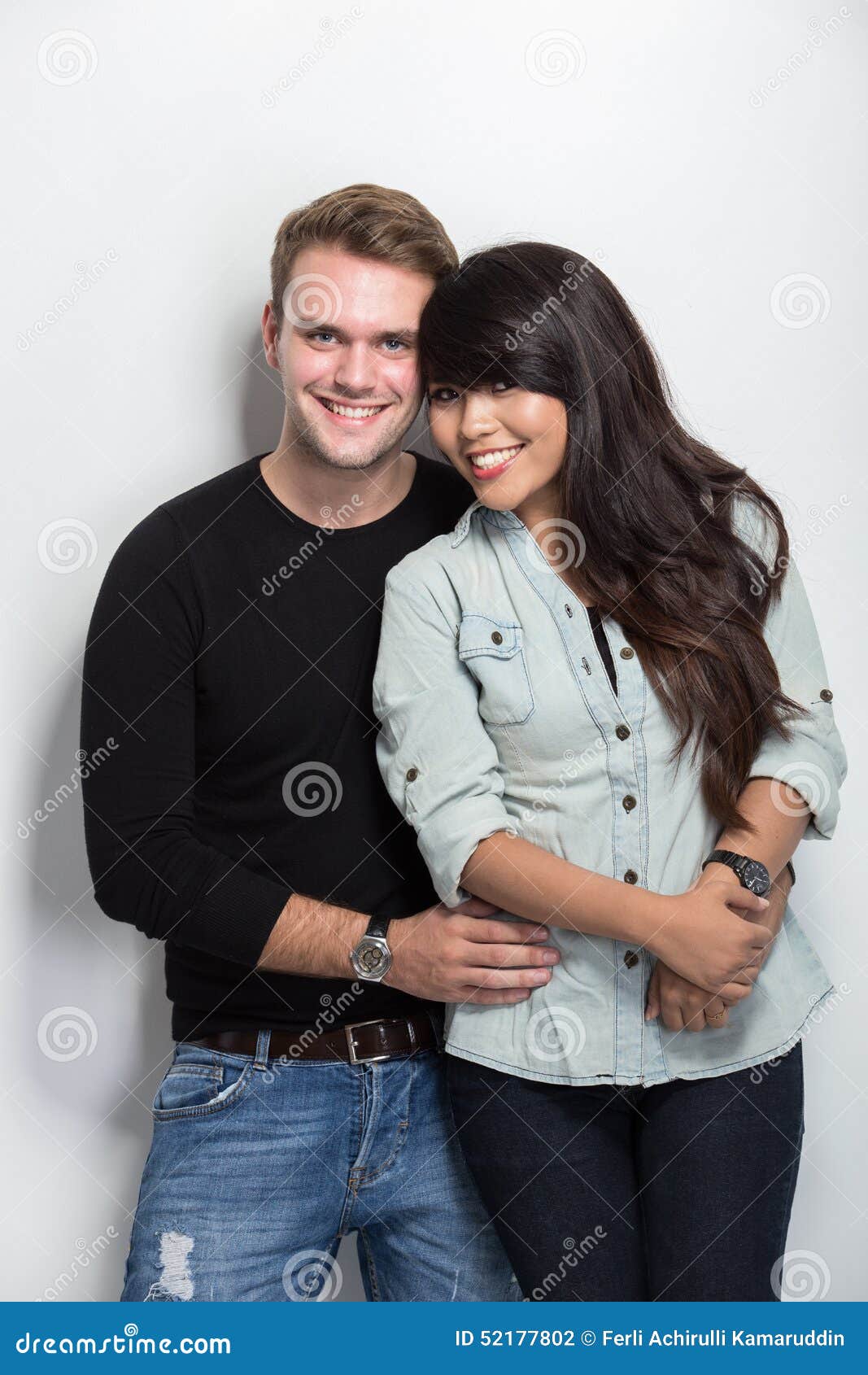 Multicultural Couple Holding Hands On Walking Trail In Tropical Forest ...