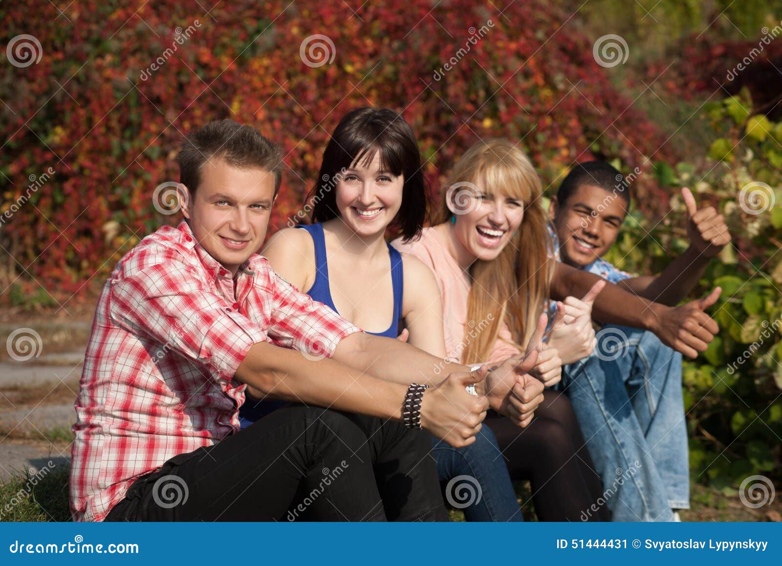 Young happy people outdoor stock image. Image of blue - 51444431