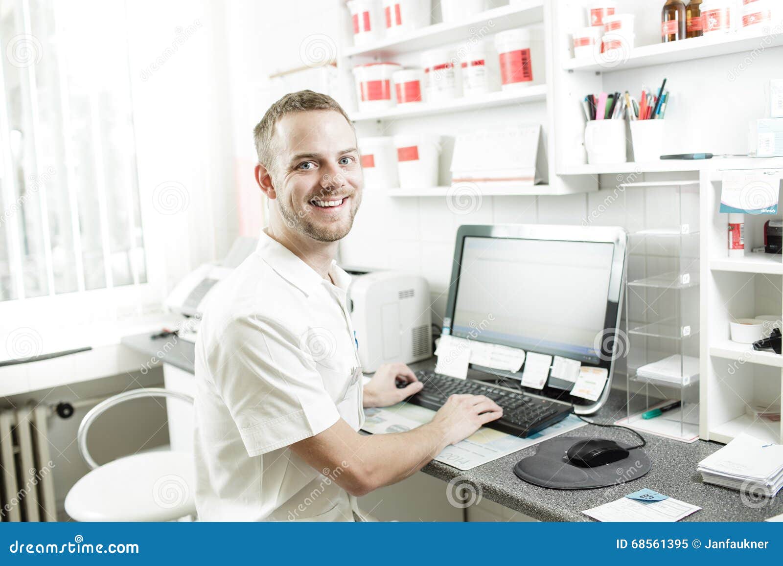 Young Happy Pharmacist Sitting Stock Image - Image of coat, business ...
