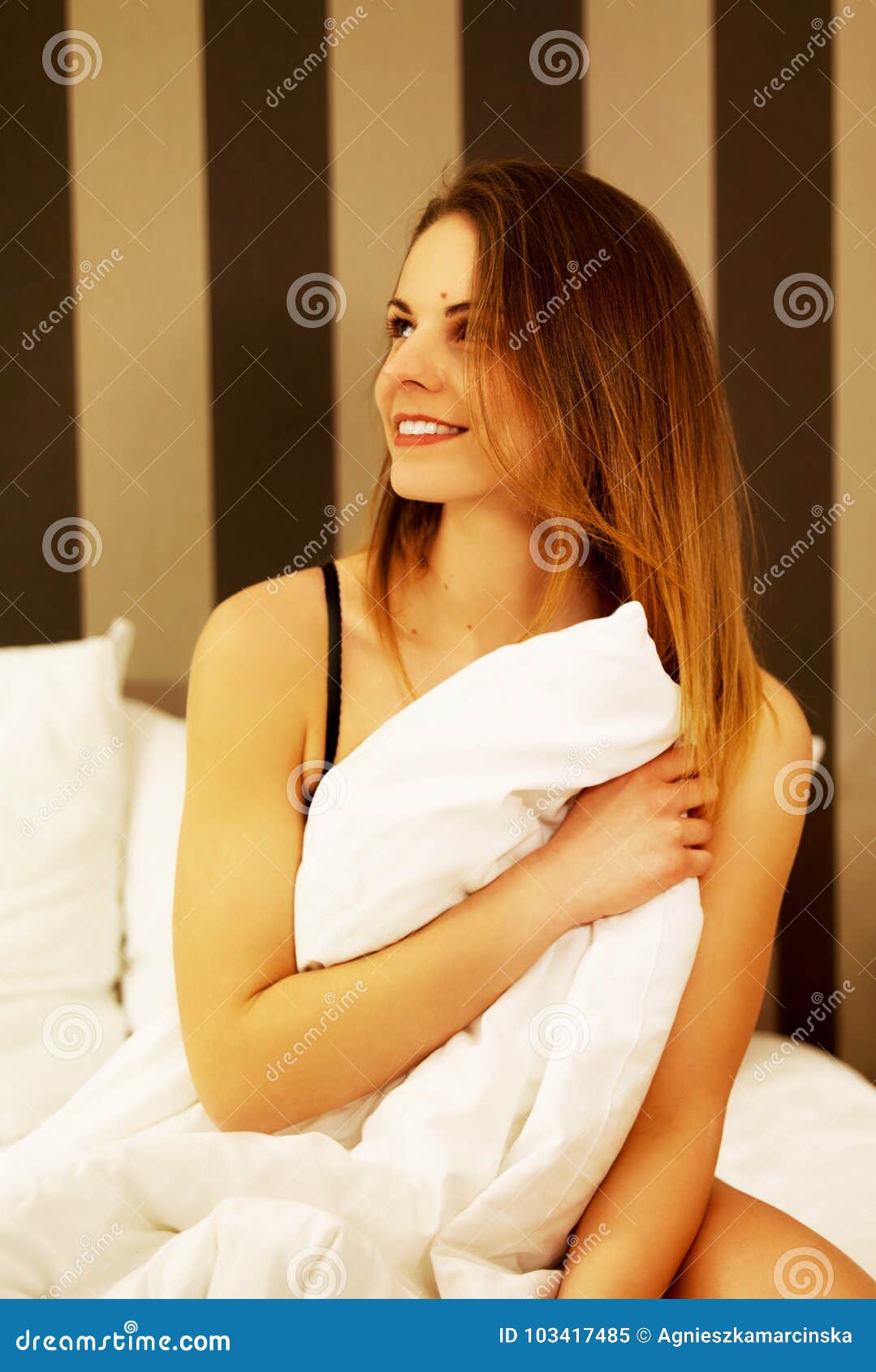 Young pretty woman in bed. stock image. Image of bedding - 103417485