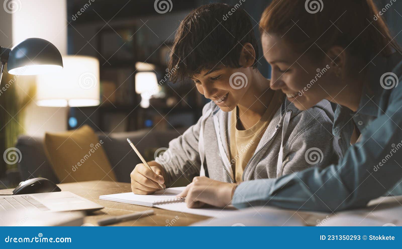 Students Doing Homework Together at Home Stock Image - Image of ...
