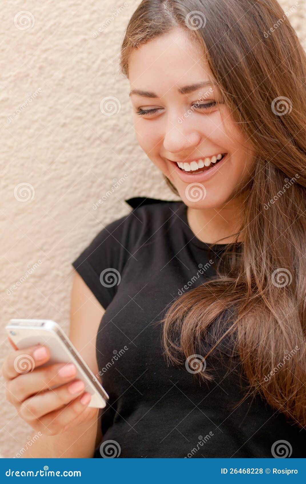 Young Happy Woman Reading Message on Mobile Phone Stock Photo - Image ...
