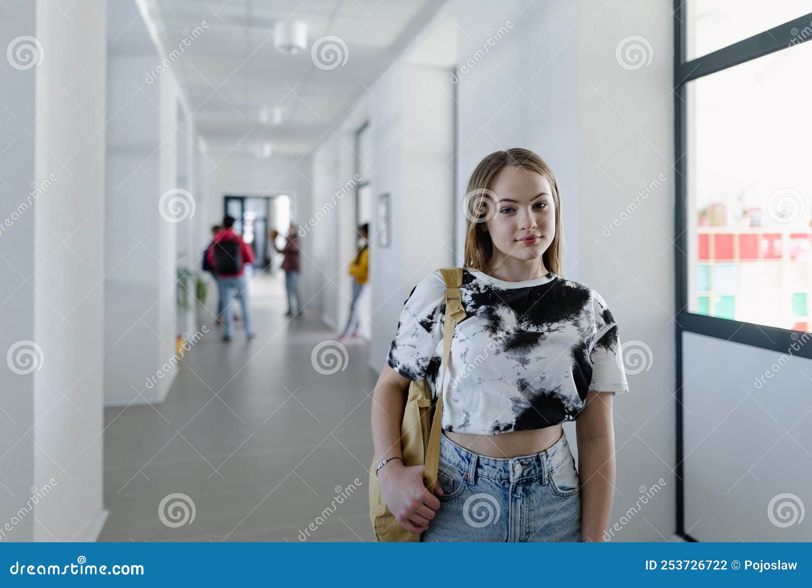 Young High School Student Walking in Corridor at School, Back To School ...