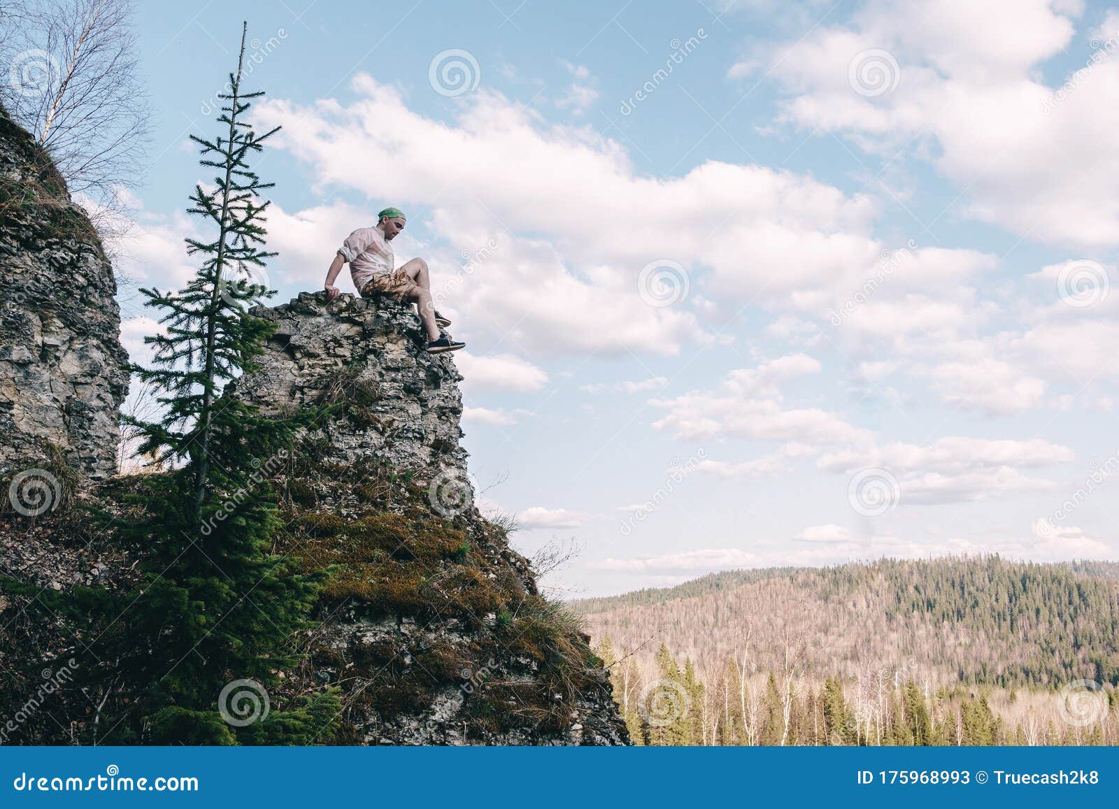 Young Hiker Looking Down from a Top of a Mountain Stock Image - Image ...