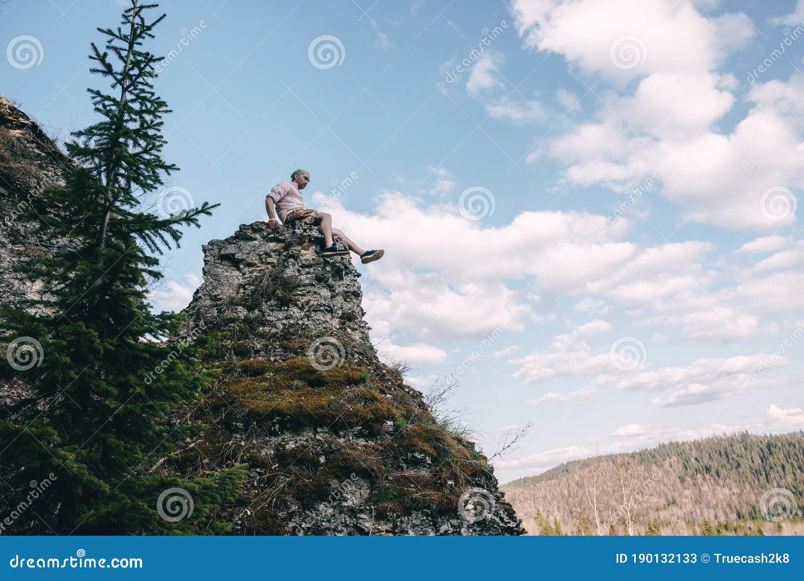 Young Hiker Looking Down from a Top of a Mountain Stock Image - Image ...