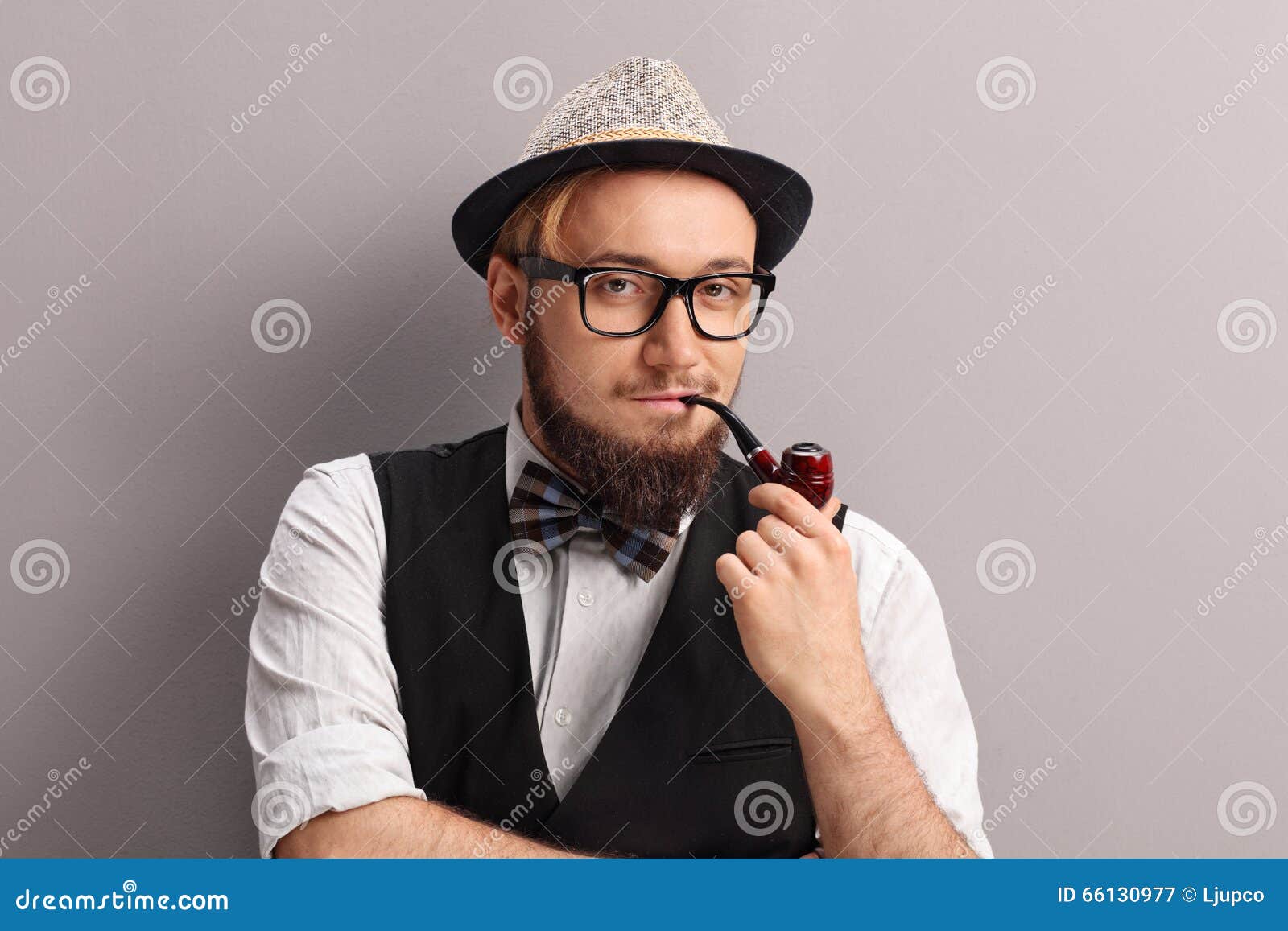 Young Hipster with Fedora Smoking a Pipe Stock Image - Image of ...