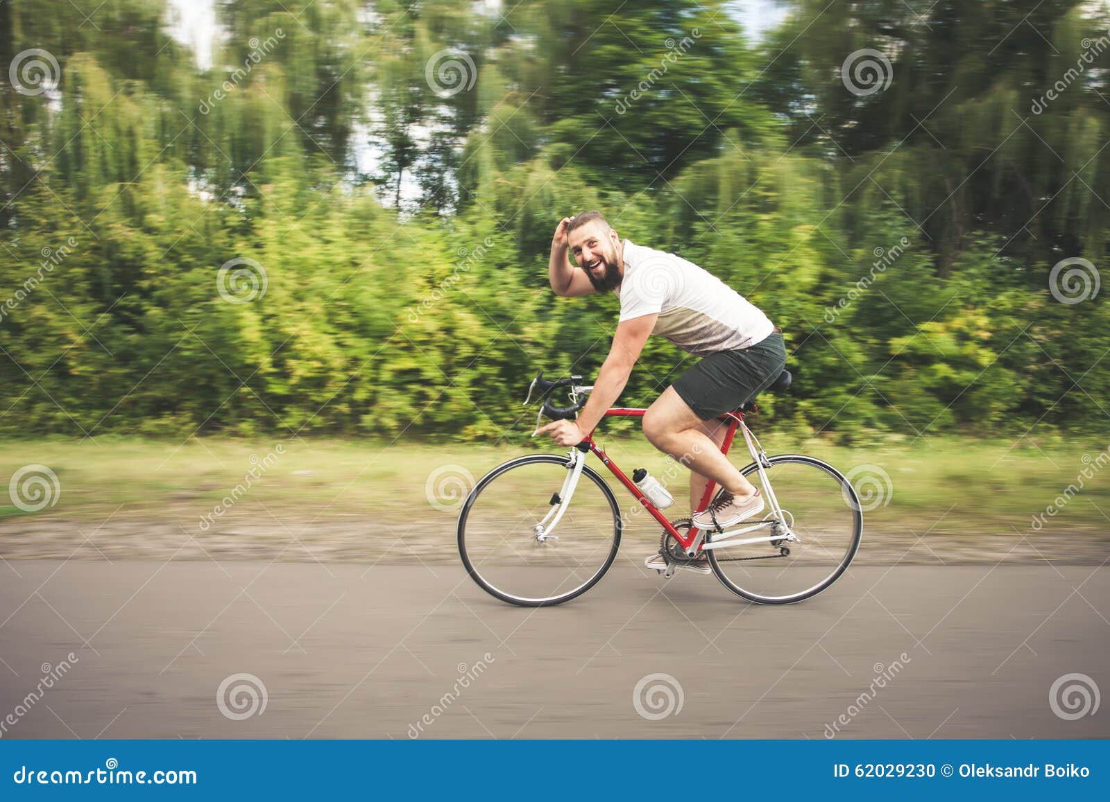Young Hipster Man Driving Fast Bicycle Stock Photo - Image of action ...
