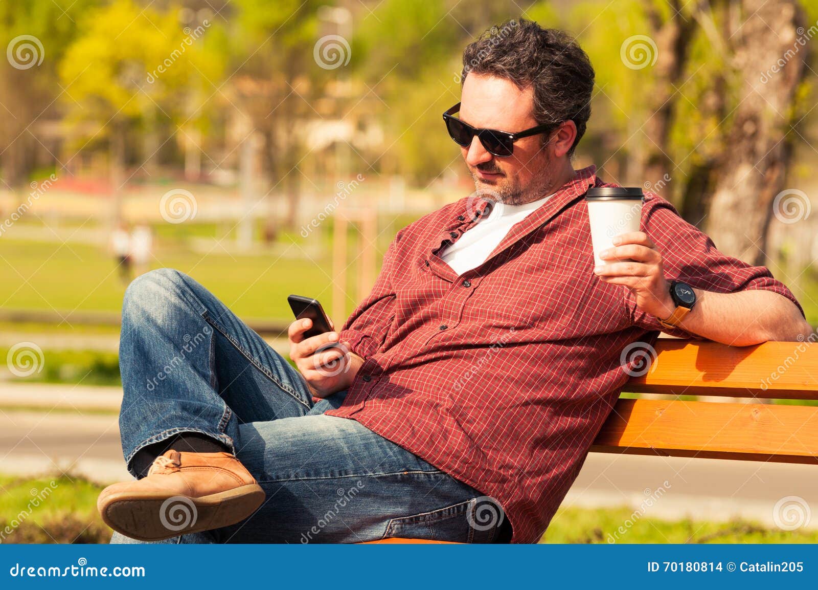 Young Hipster Man Standing Outside in the Park Stock Photo - Image of ...